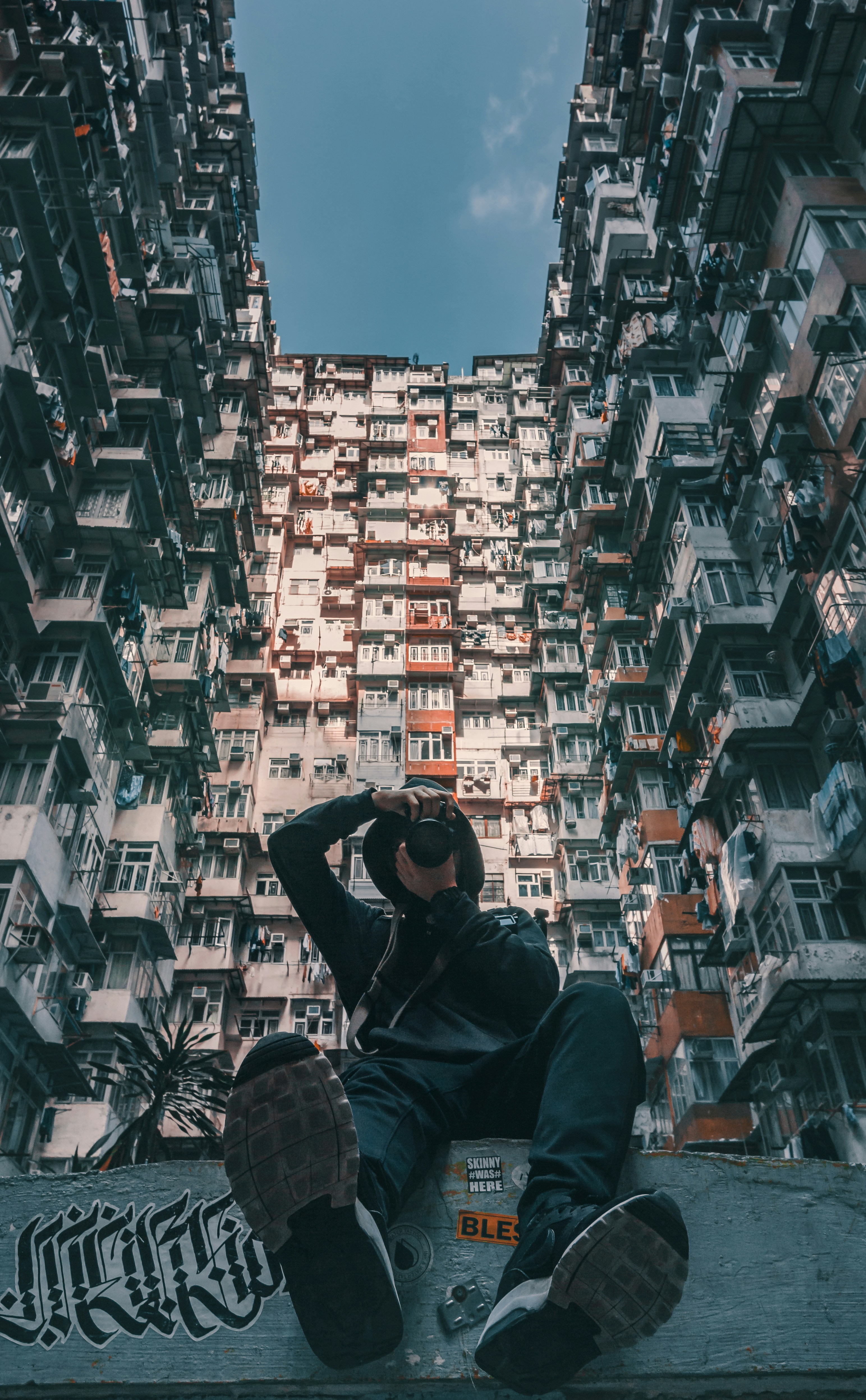 Man taking photo of building photo – Free City Image on Unsplash