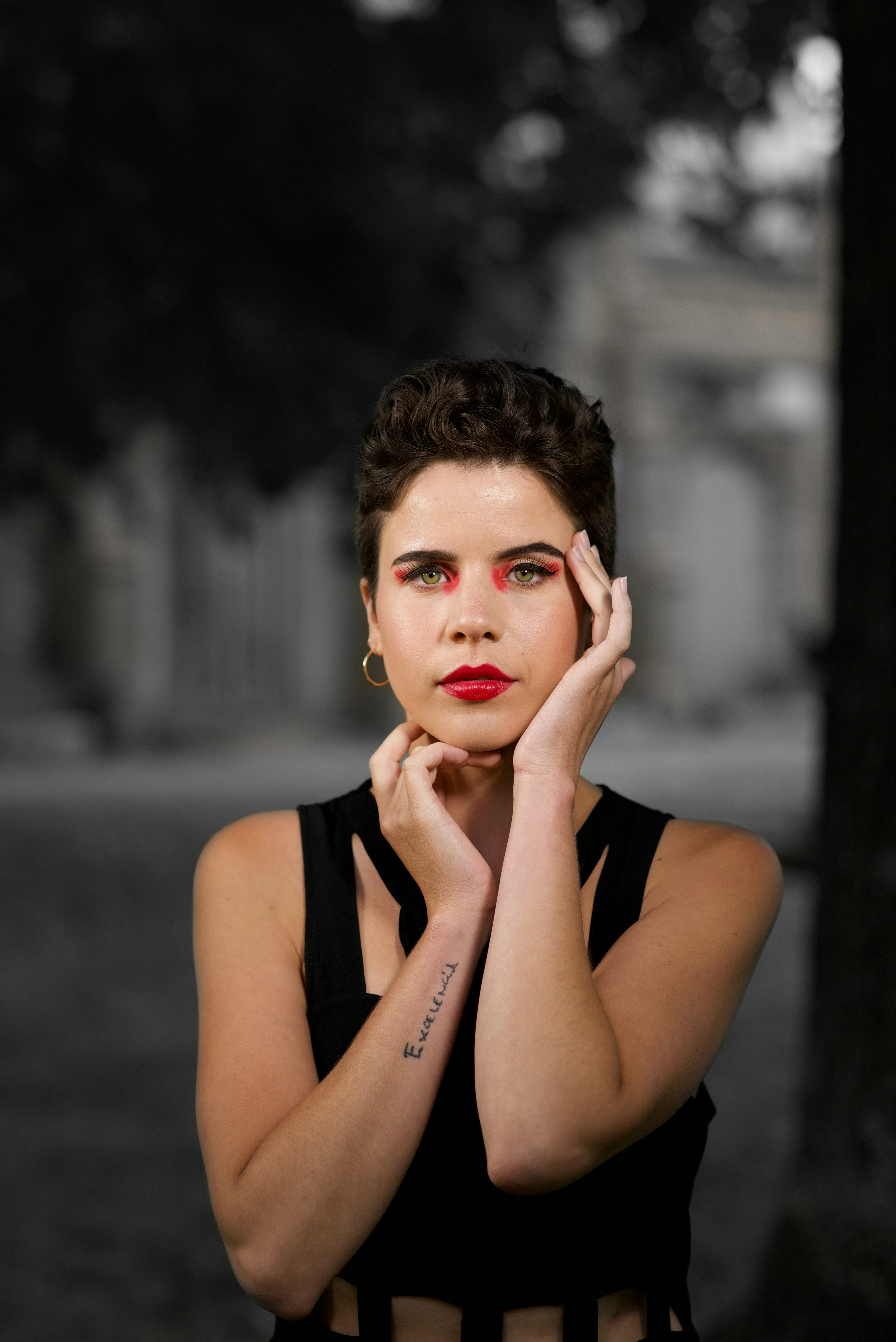 Crimson Gaze Against a Monochrome Portrait