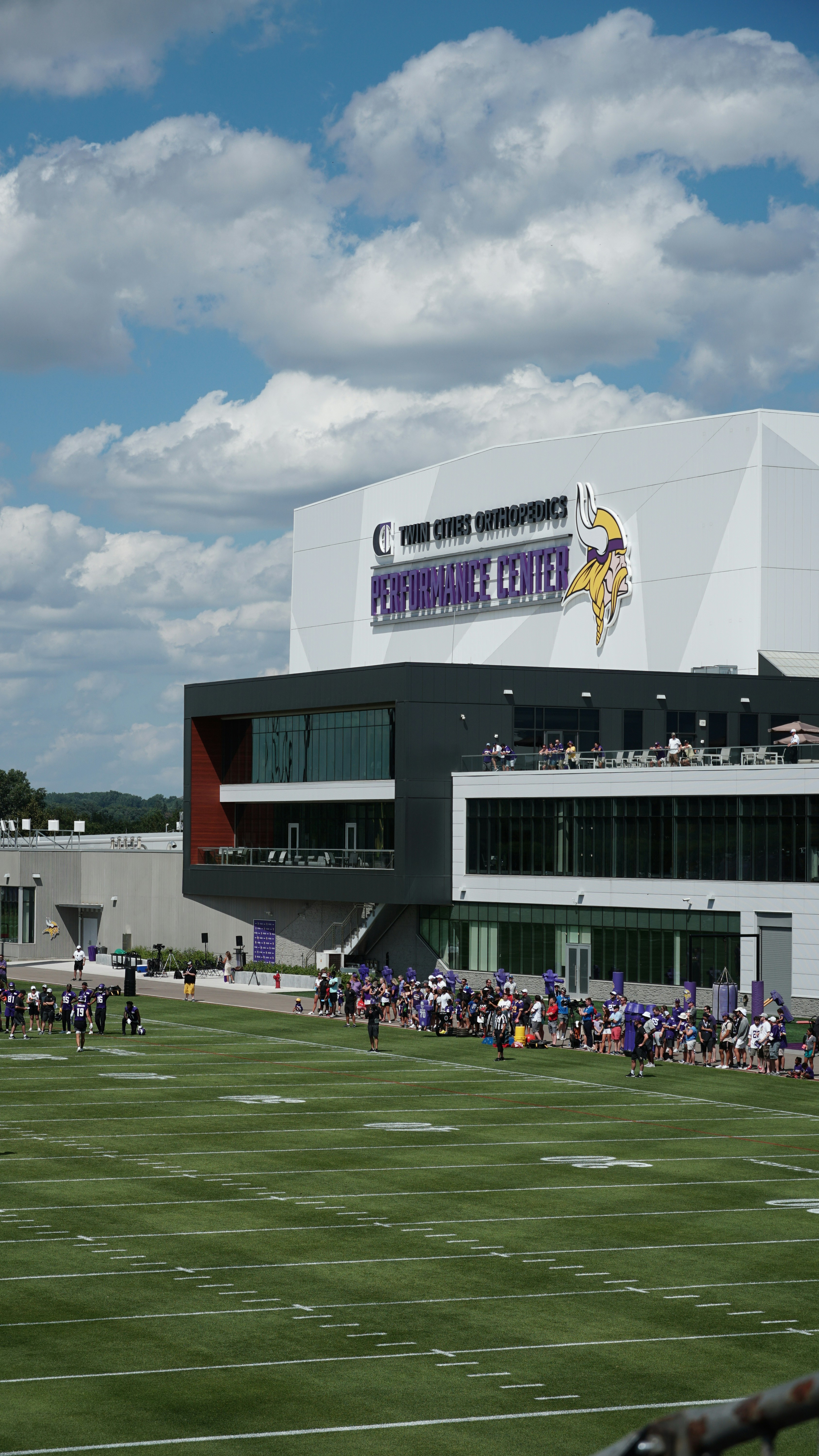 people outside a football field