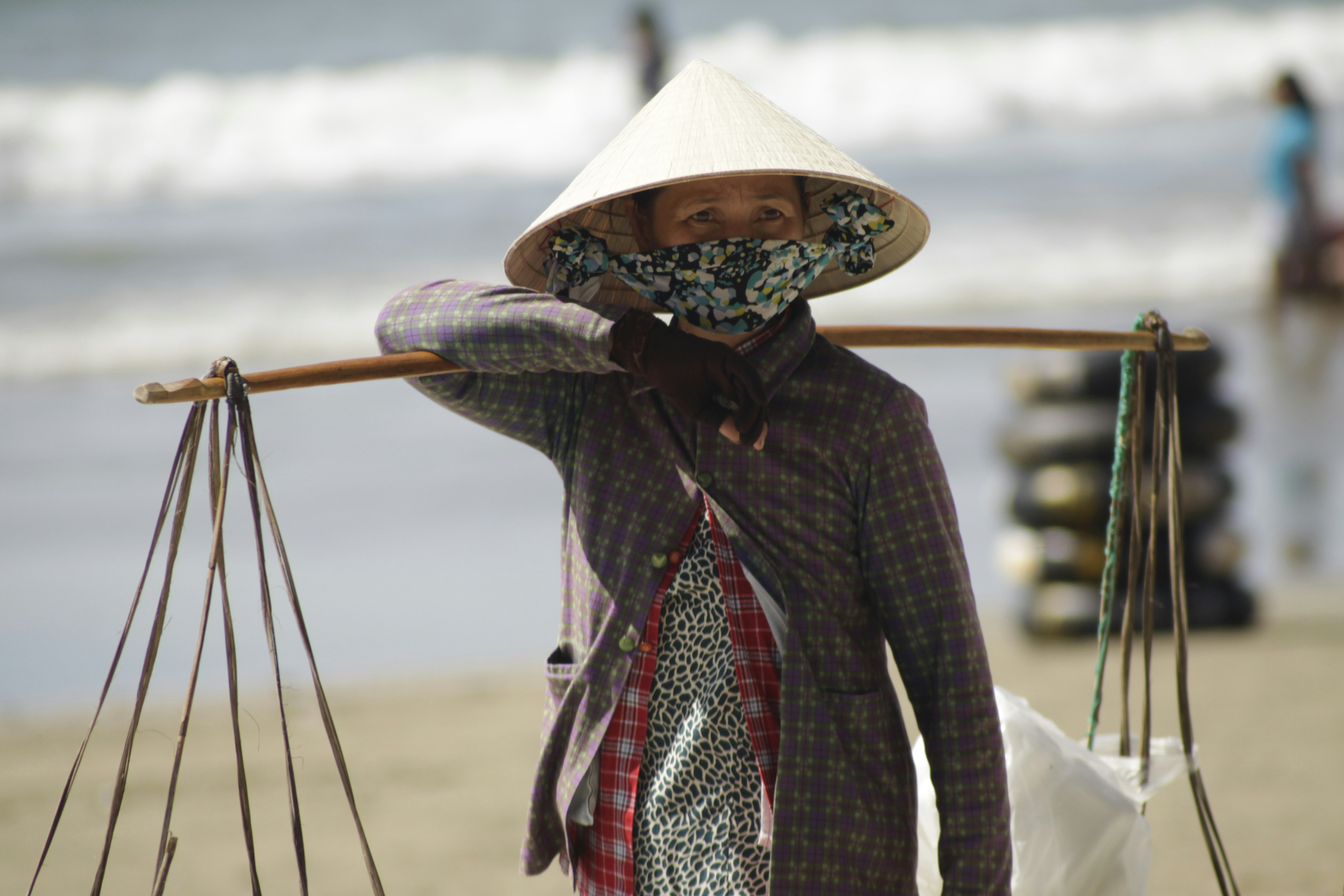 Person carrying brown rod photo – Free Phan thiet Image on Unsplash