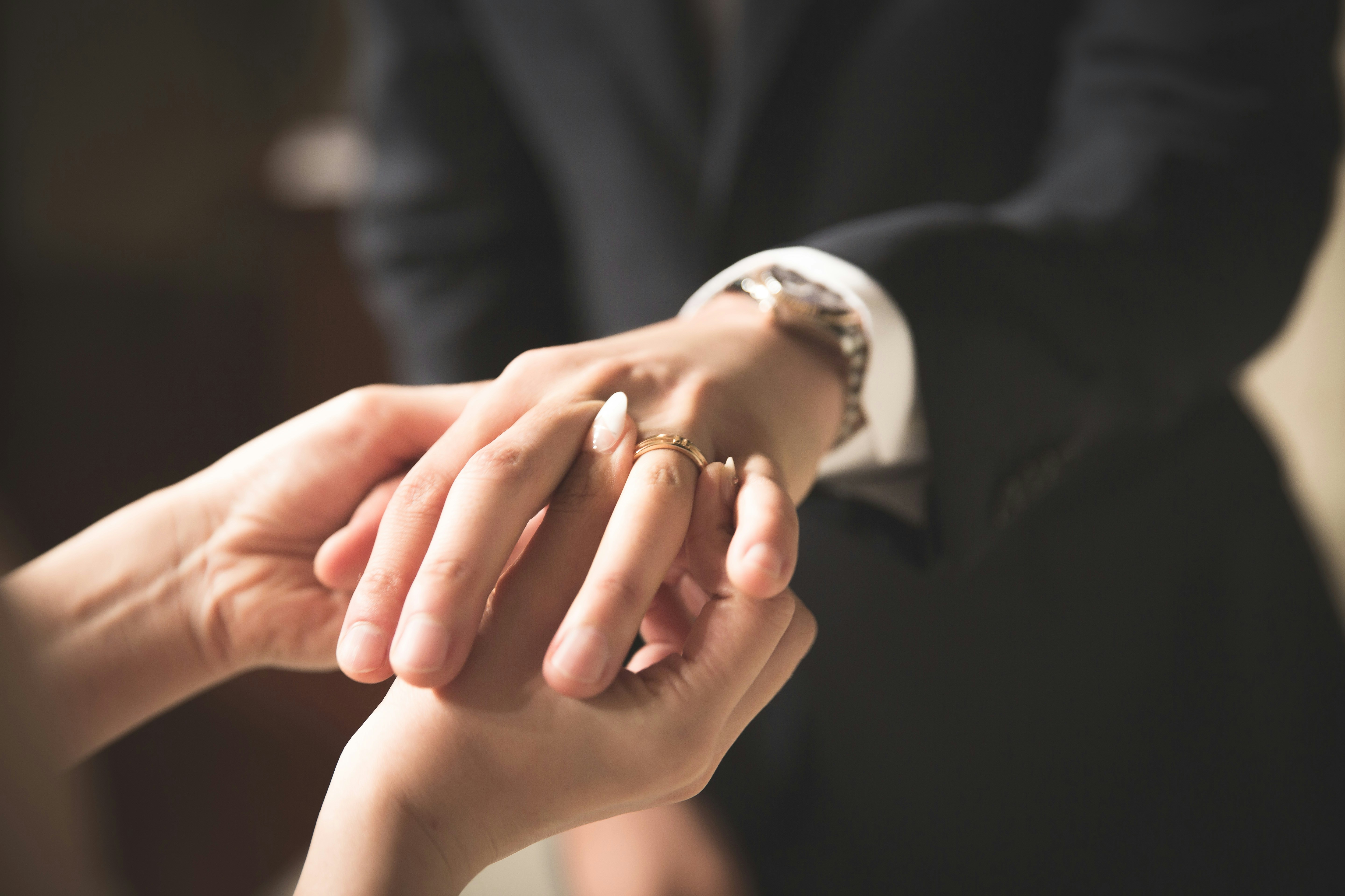 Person putting ring photo – Free Holding hands Image on Unsplash