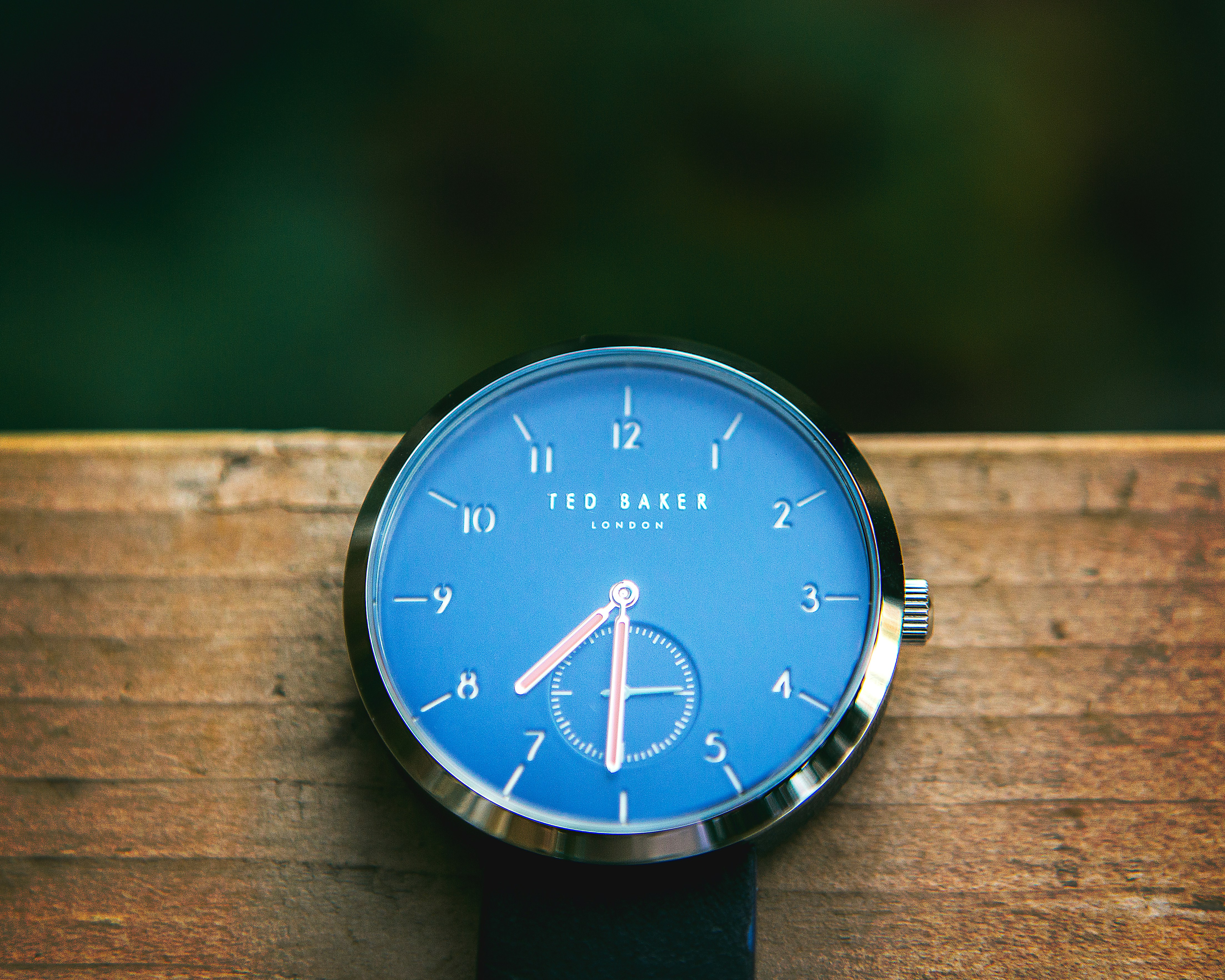 Round blue Ted Baker watch at 7:31 photo – Free Building Image on Unsplash
