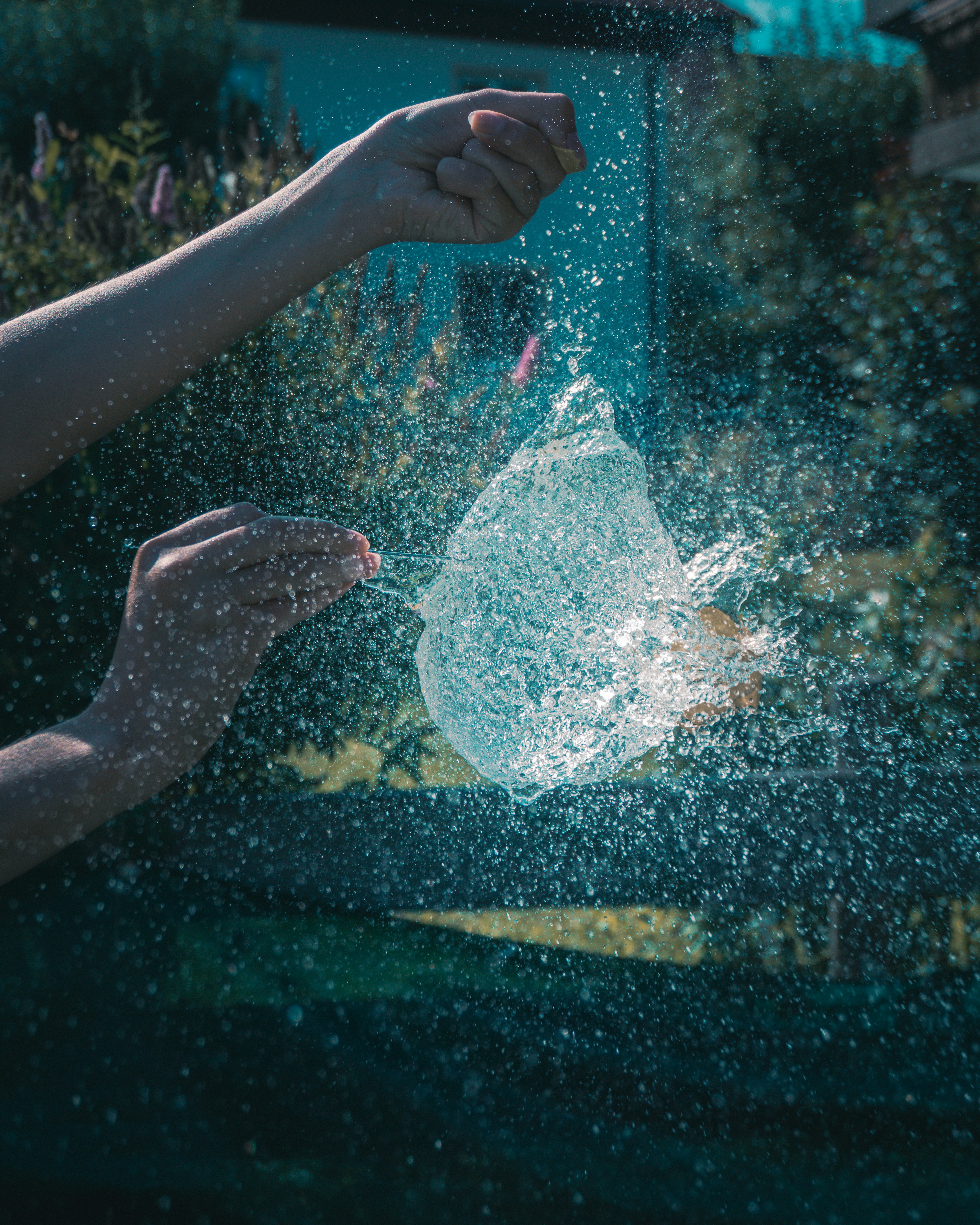 Waterburst: The Moment Sunlight Meets Ice in Motion