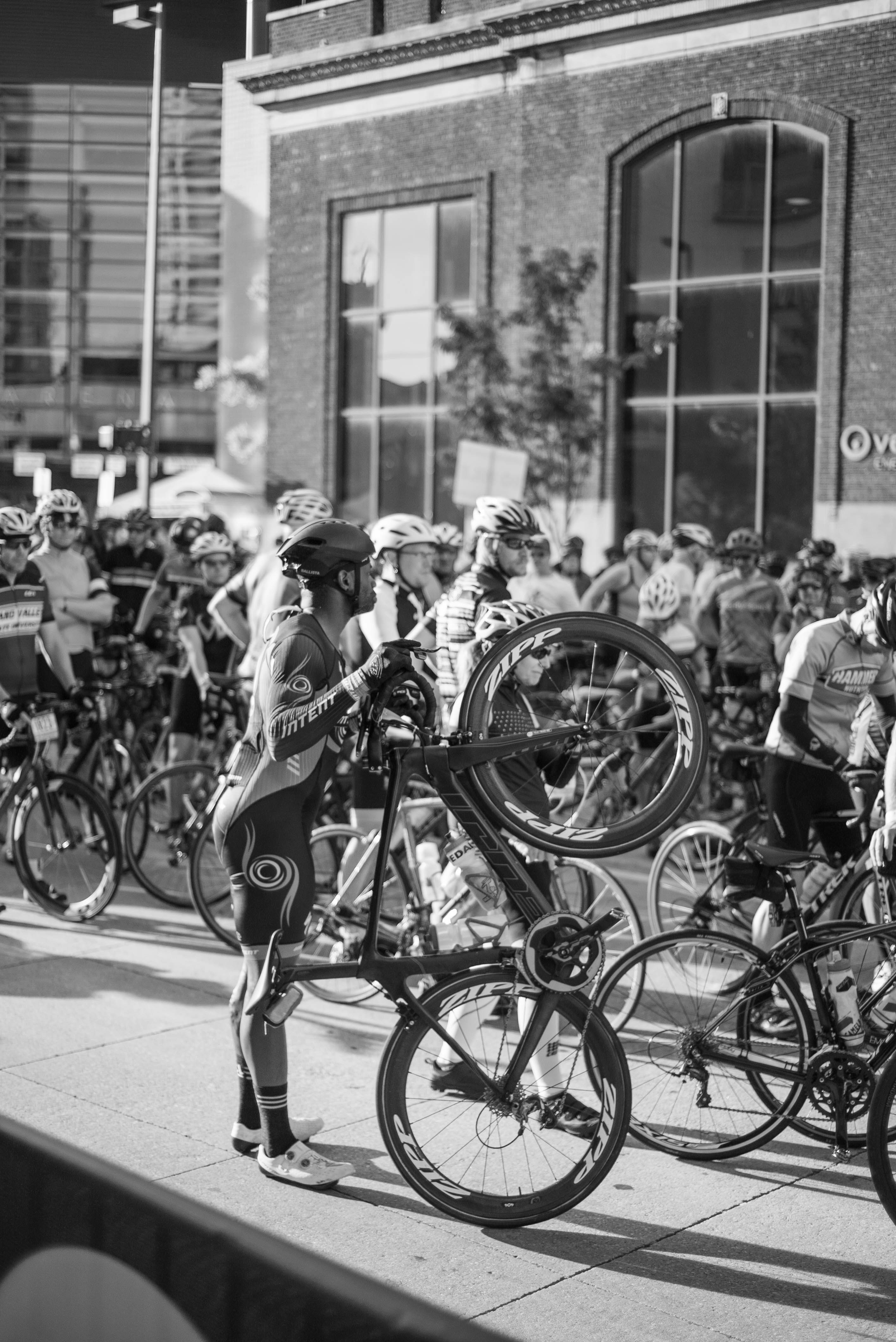 Urban Cyclists Rally: A Wheelie Moment Amid the Crowd