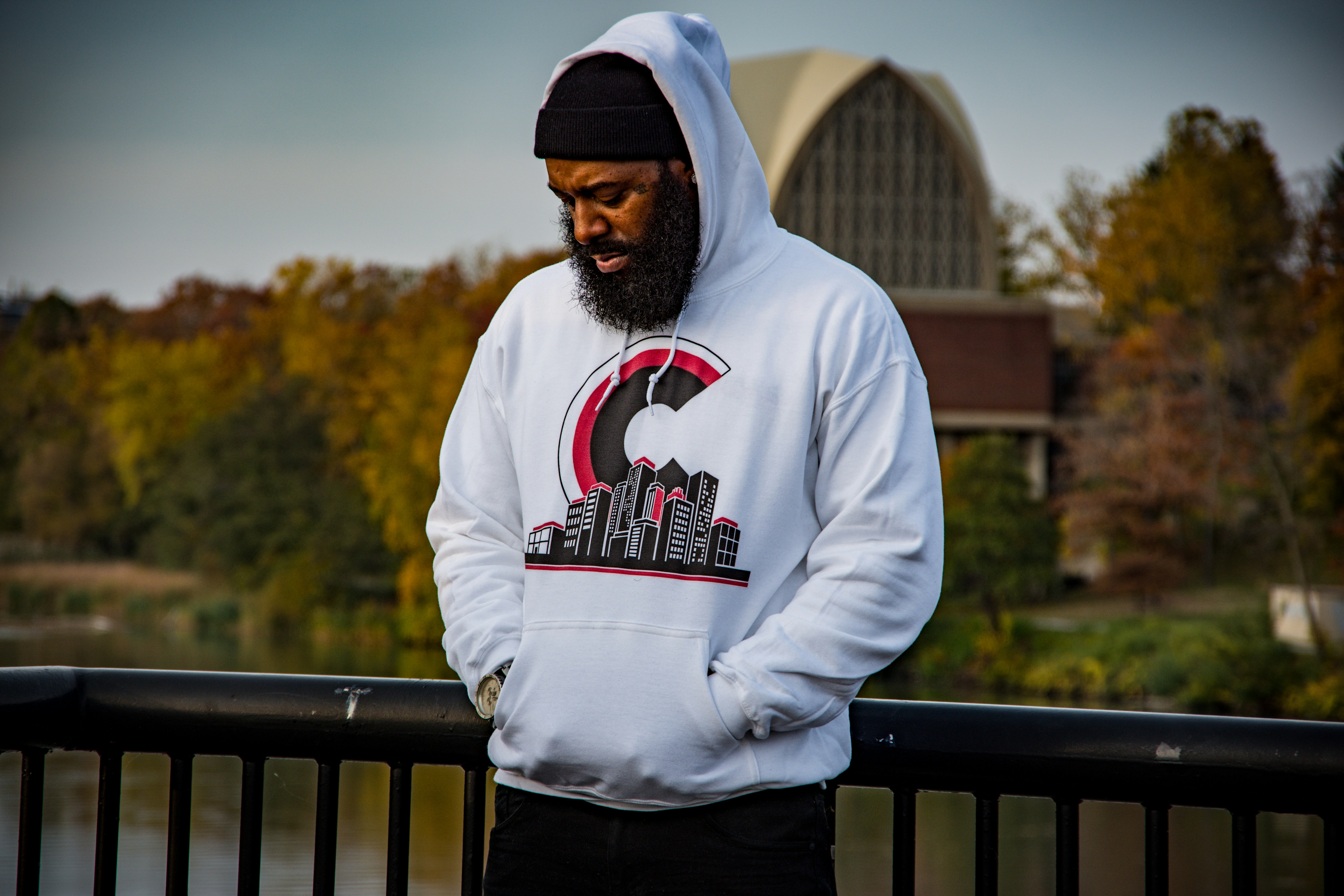 Hooded contemplations by the riverbank