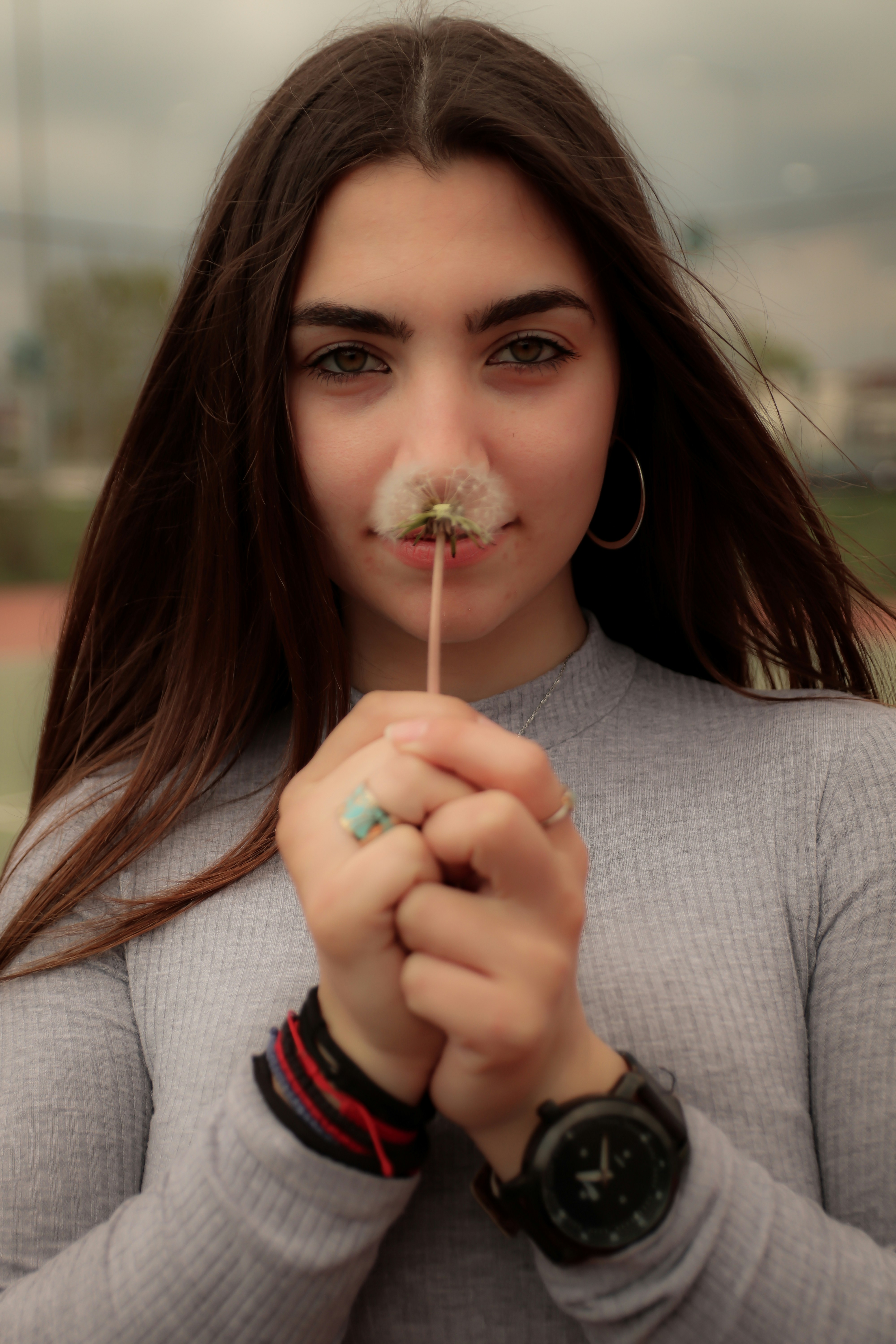 Dandelion Mask: A Close-Willed Gaze Into a Gentle Moment