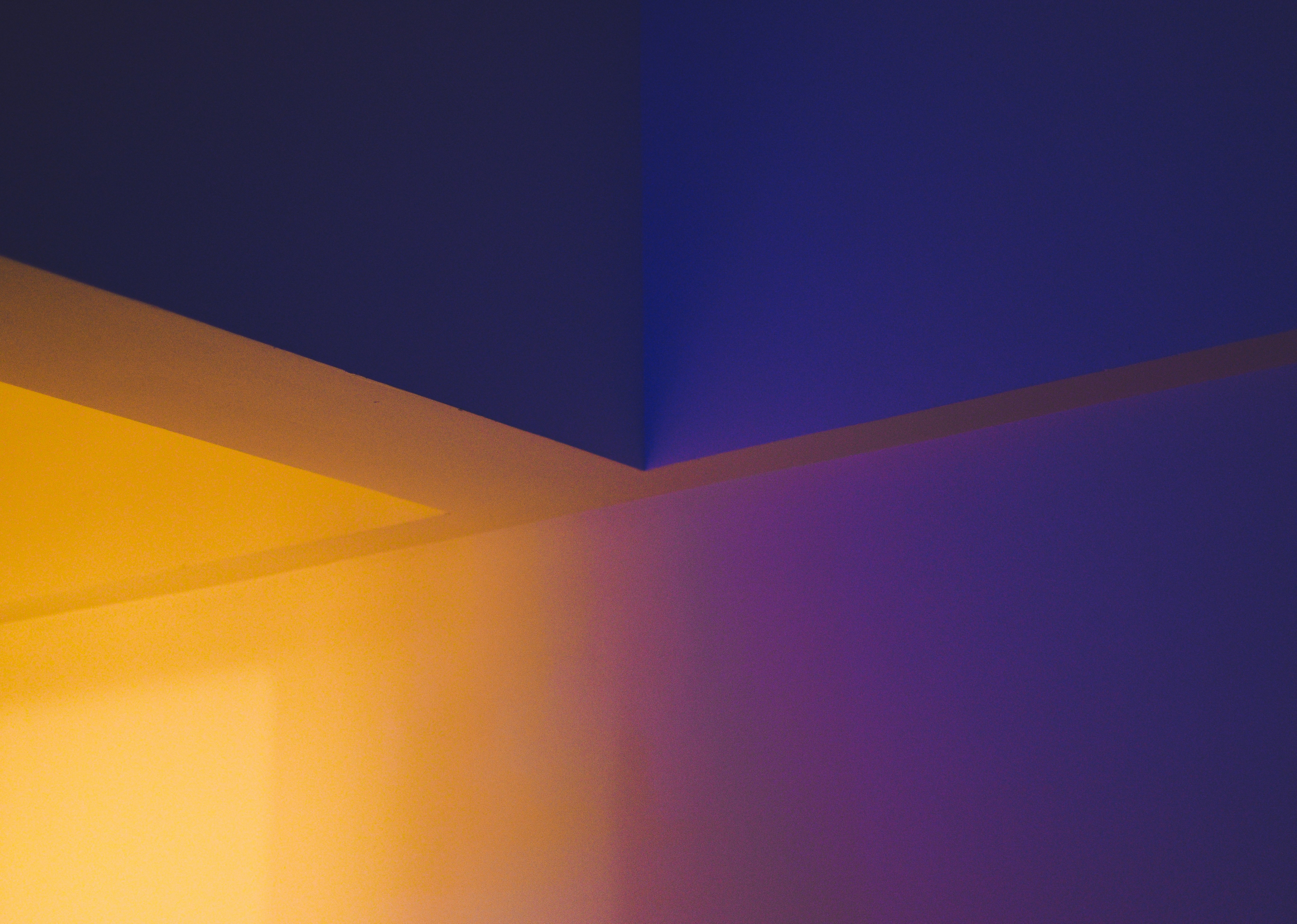 A room with a yellow wall and a blue wall photo – Free Building Image ...