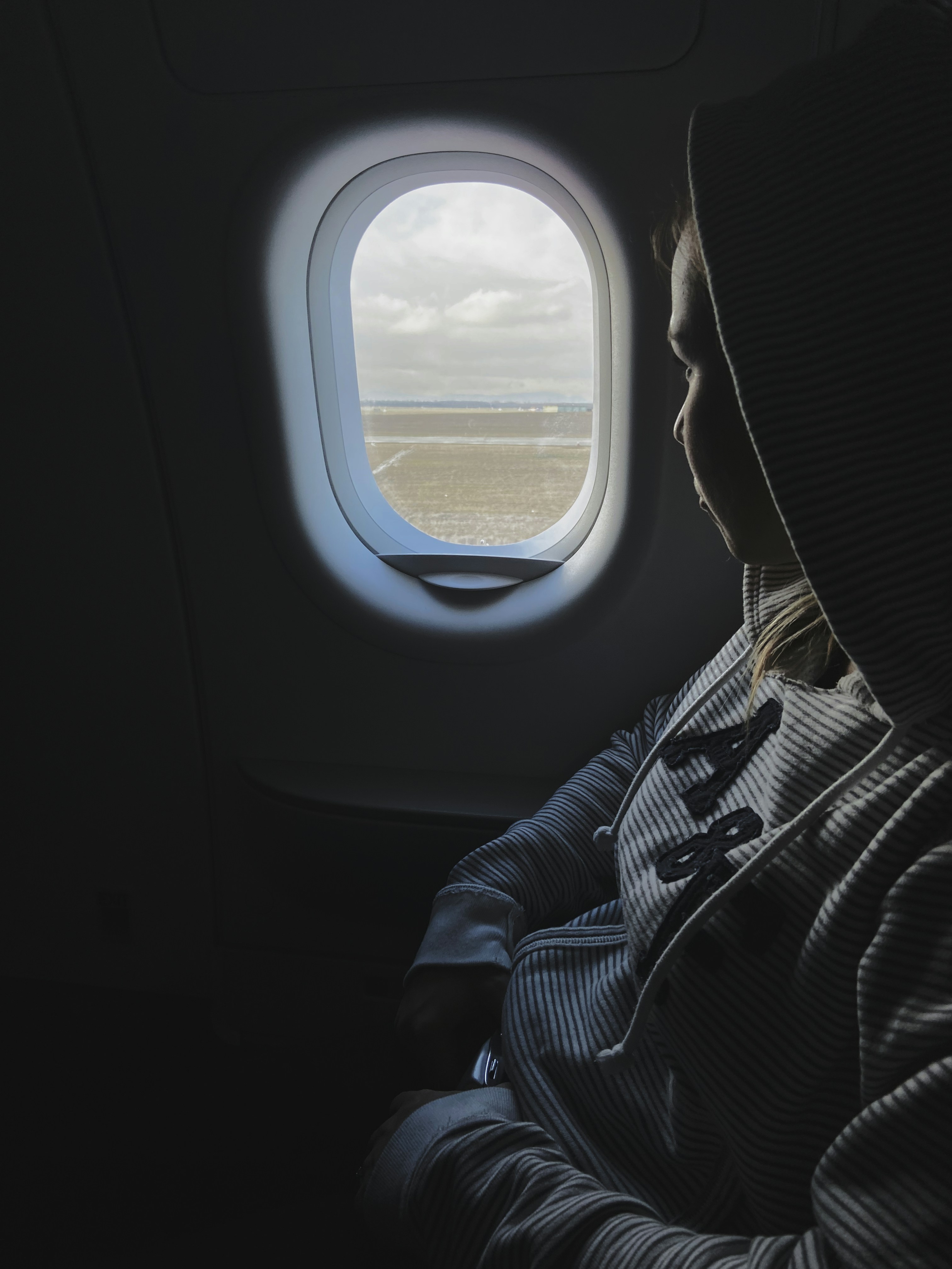 Person riding airplane photo – Free Grey Image on Unsplash