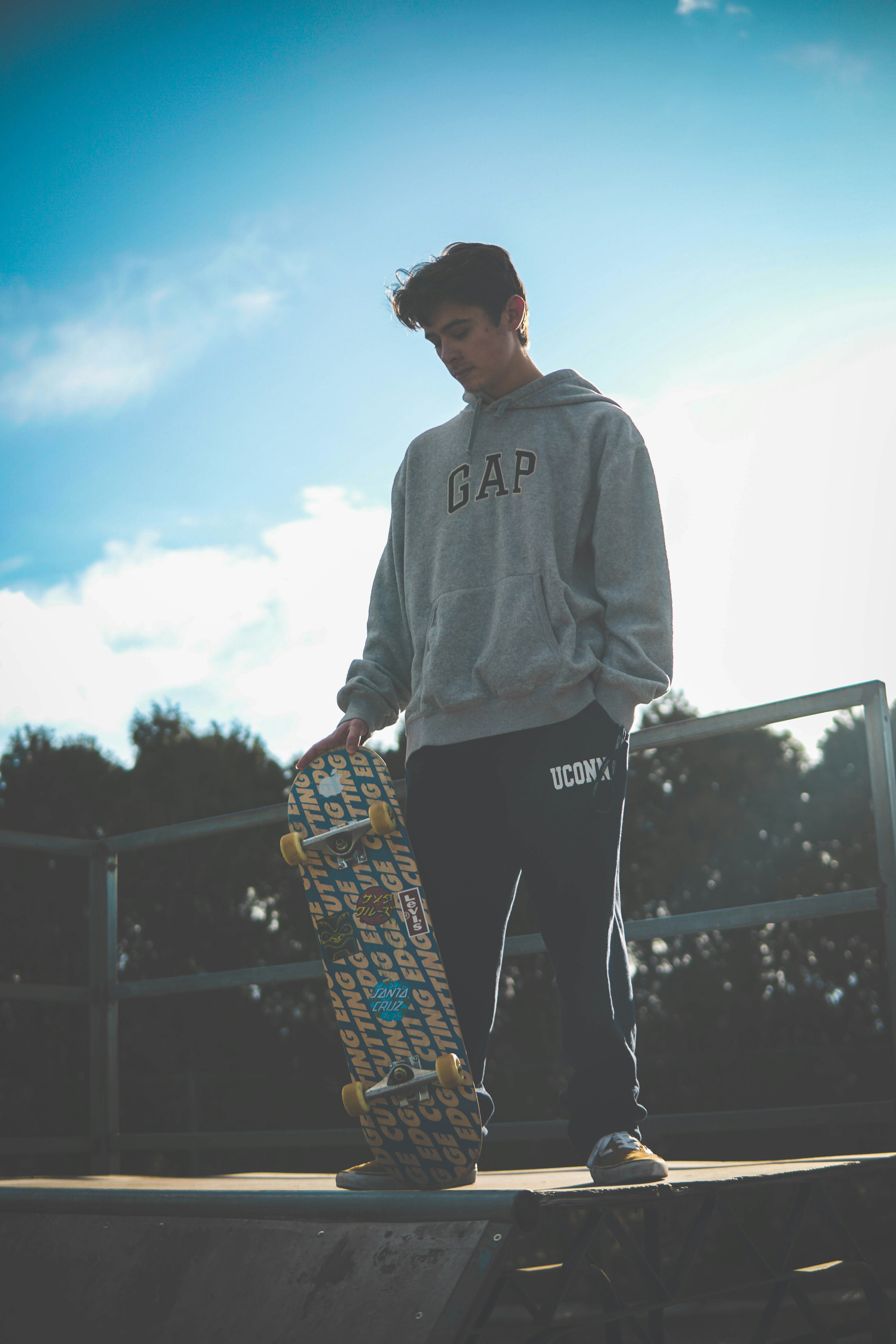 Skateboarder at the Edge: Quiet Confidence Under Sky