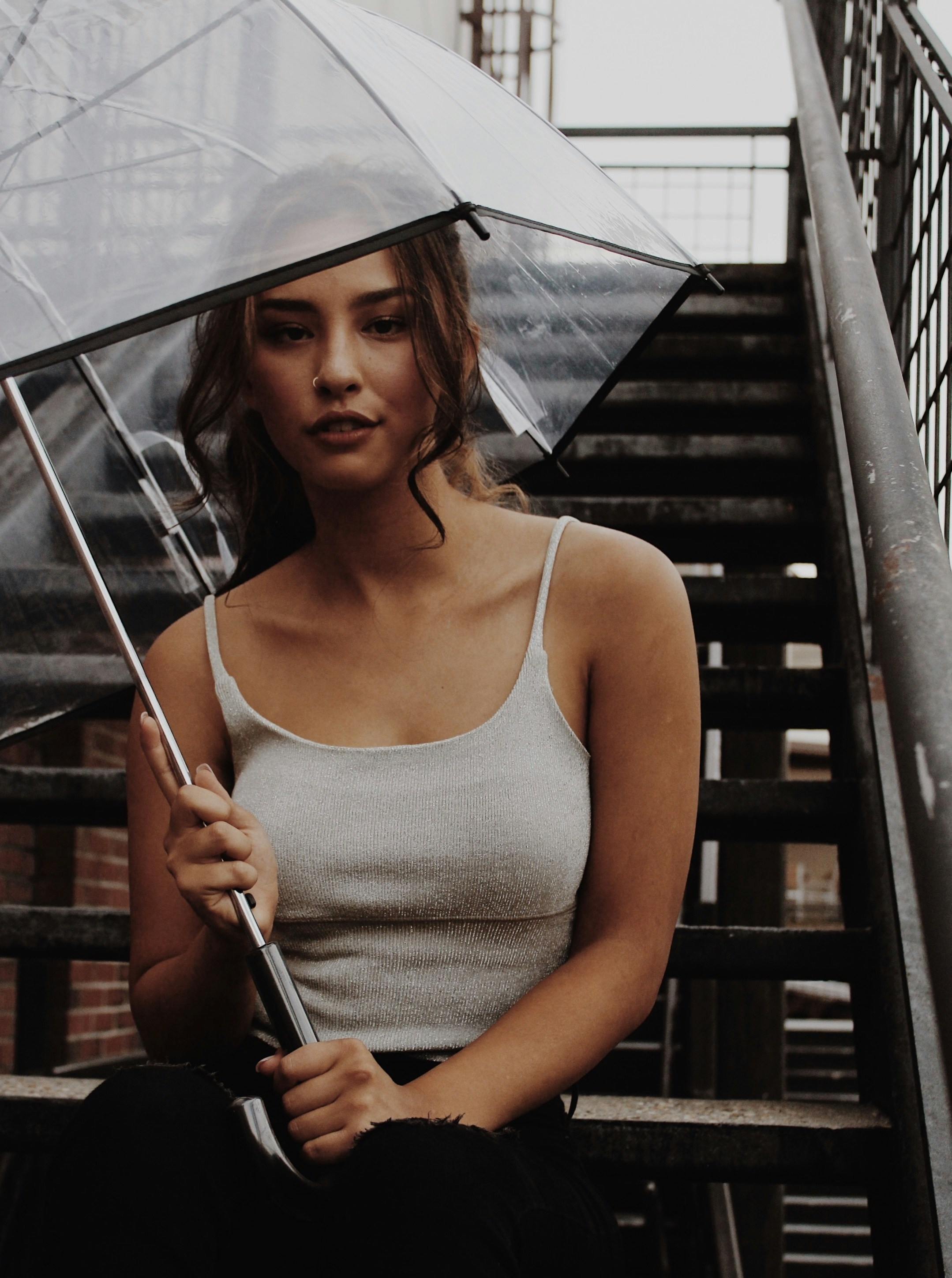 Woman in white tank top holding umbrella photo – Free Black Image on ...