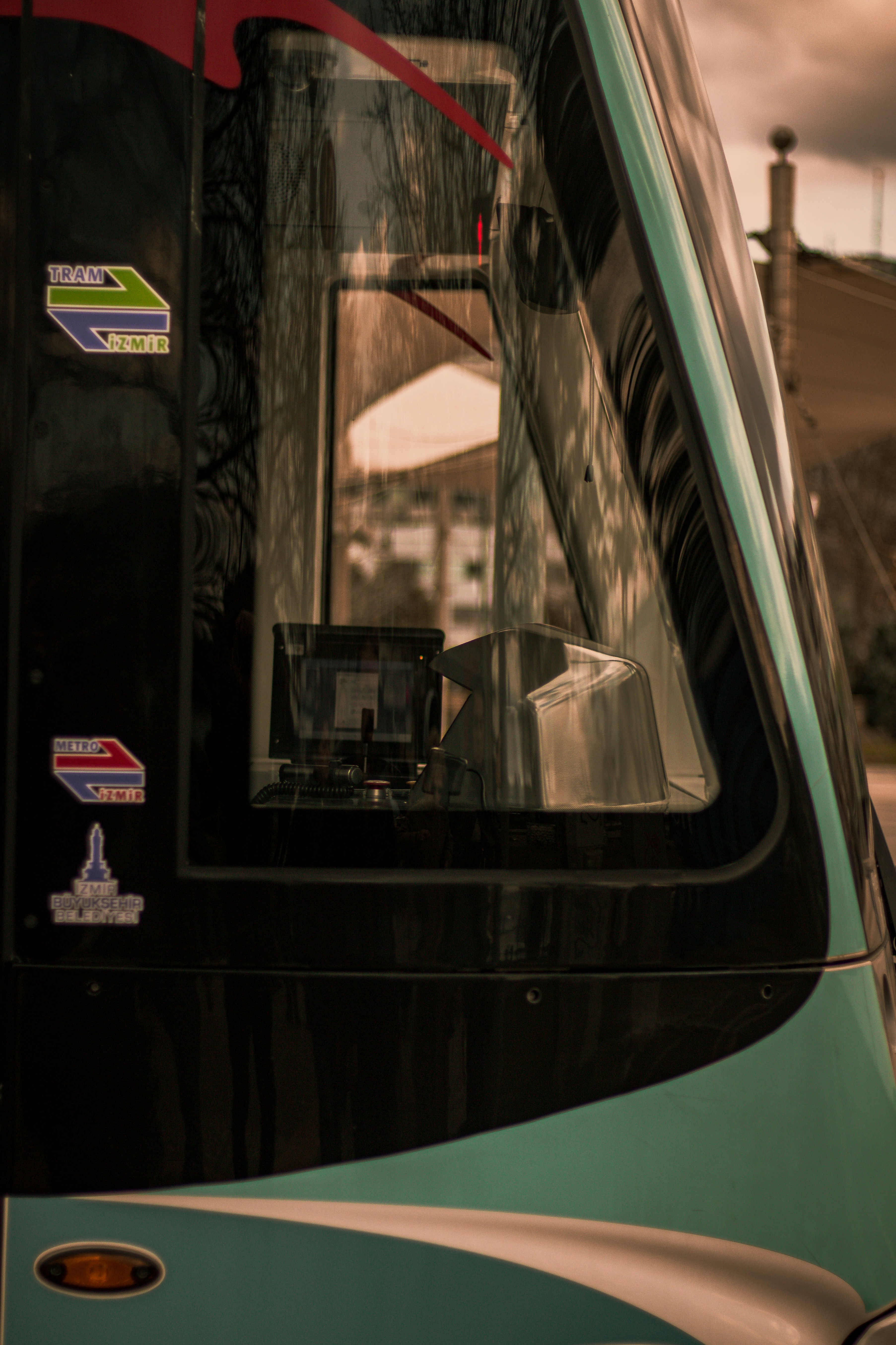 A street-going tram and a photo in soft brown tones