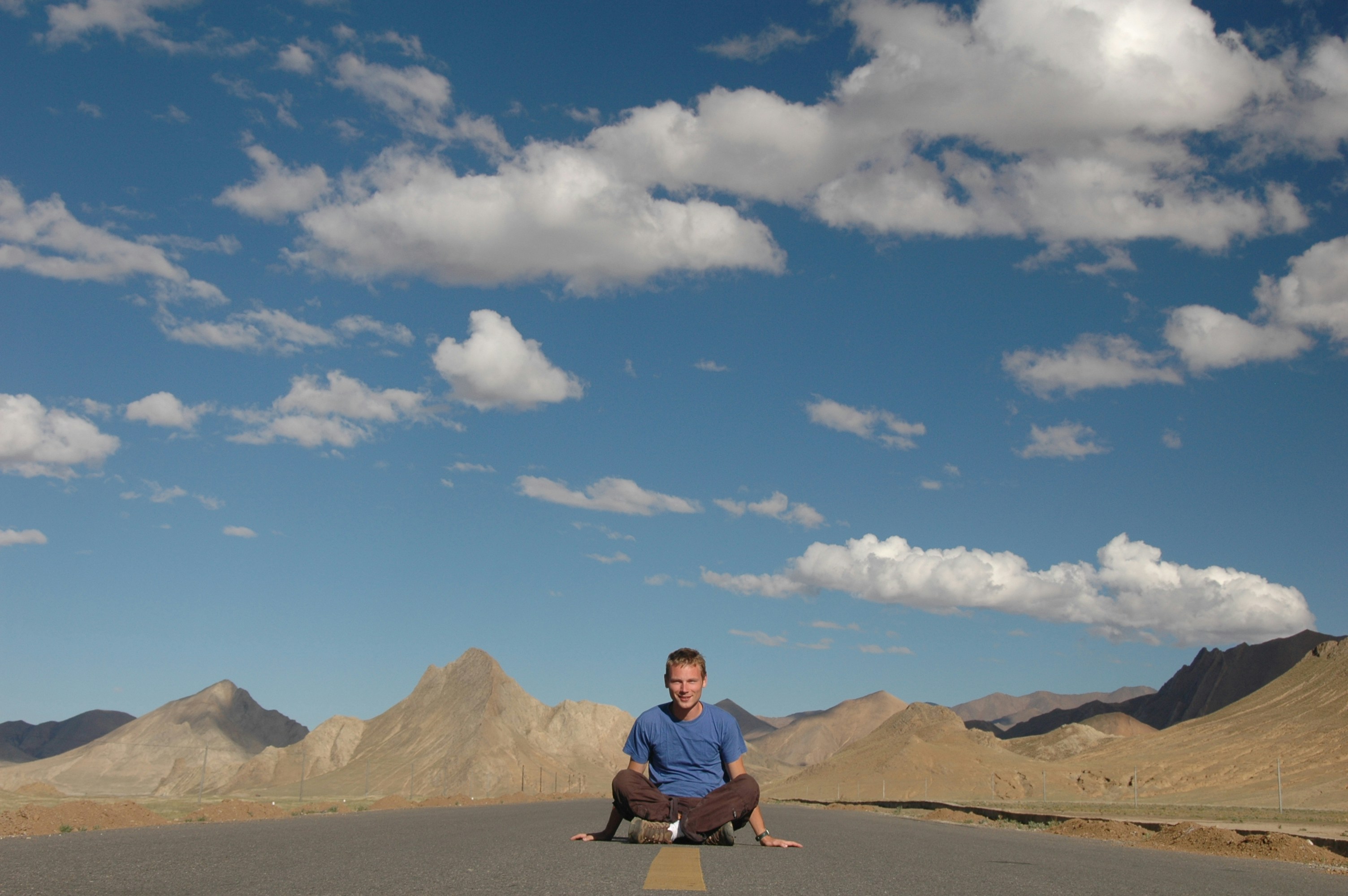Horizon Runner: A Solitary Rider on a Desert Road