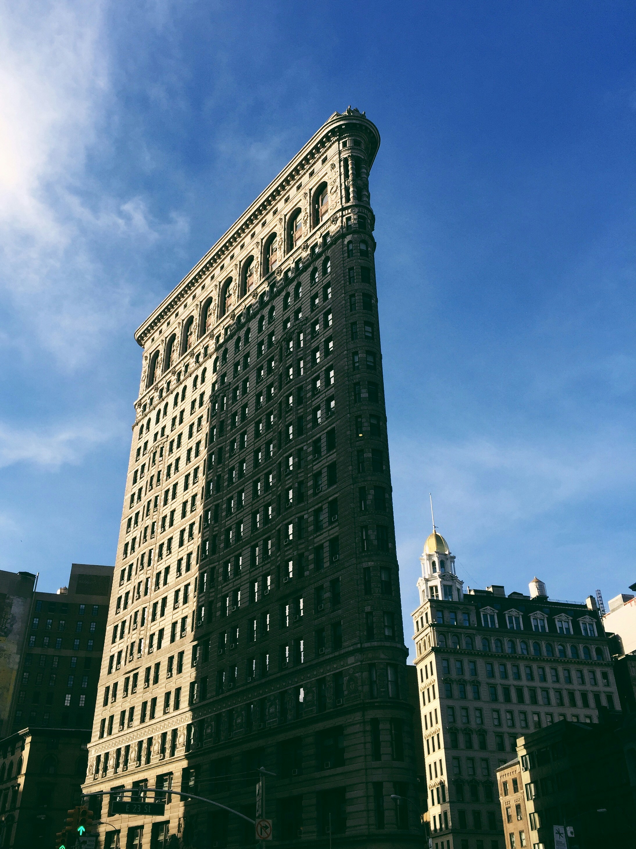 Low angle view of building under sky photo – Free Blue Image on Unsplash