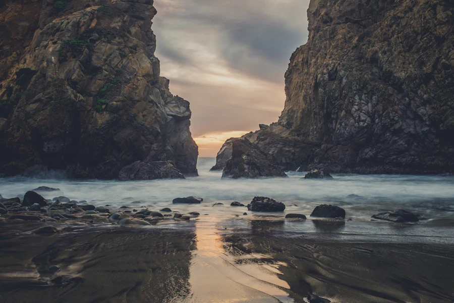 Pfeiffer Beach at Dusk | river overflow in between rock formation