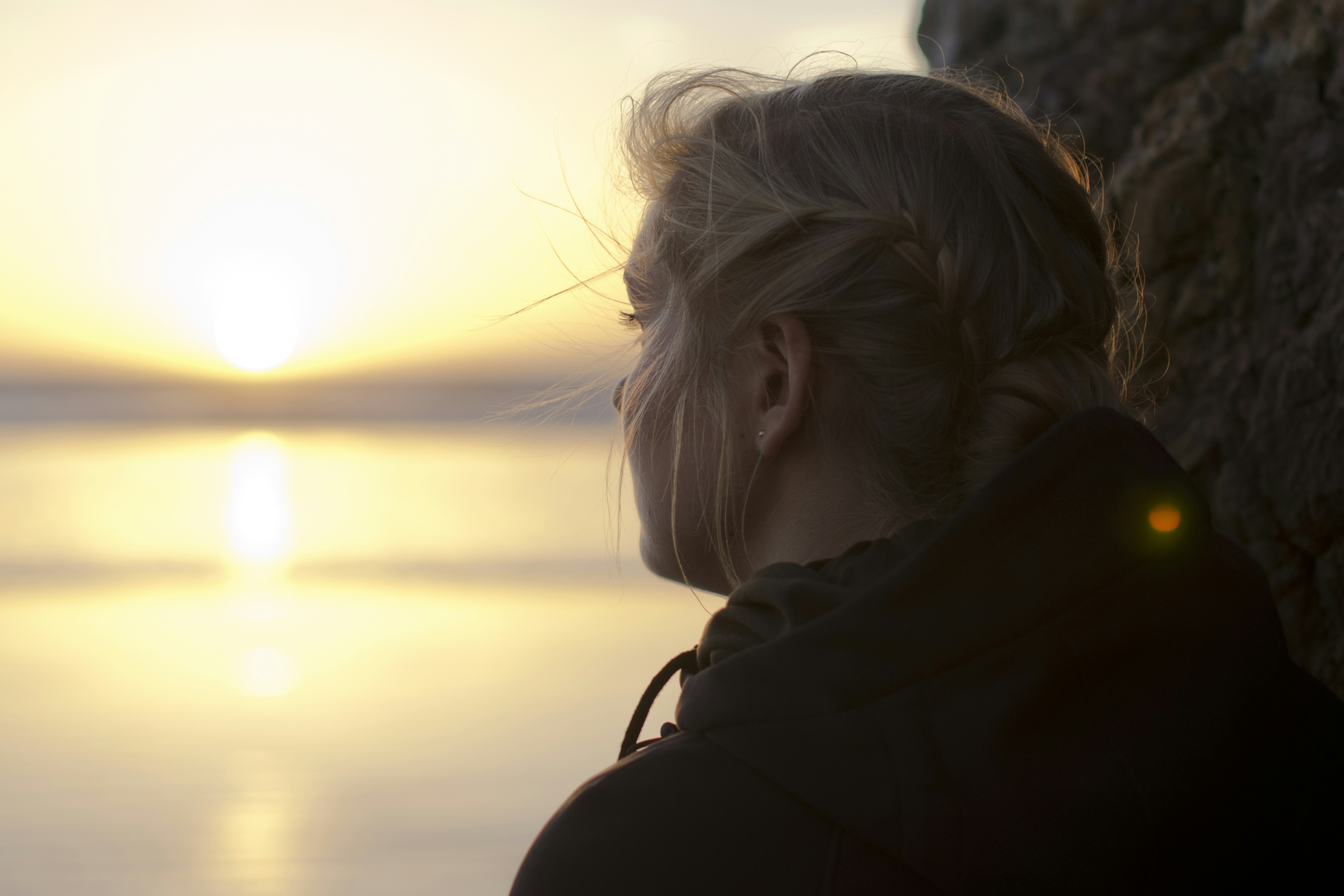 Dusk's Edge: A Quiet Profile Gazing Toward the Sunset