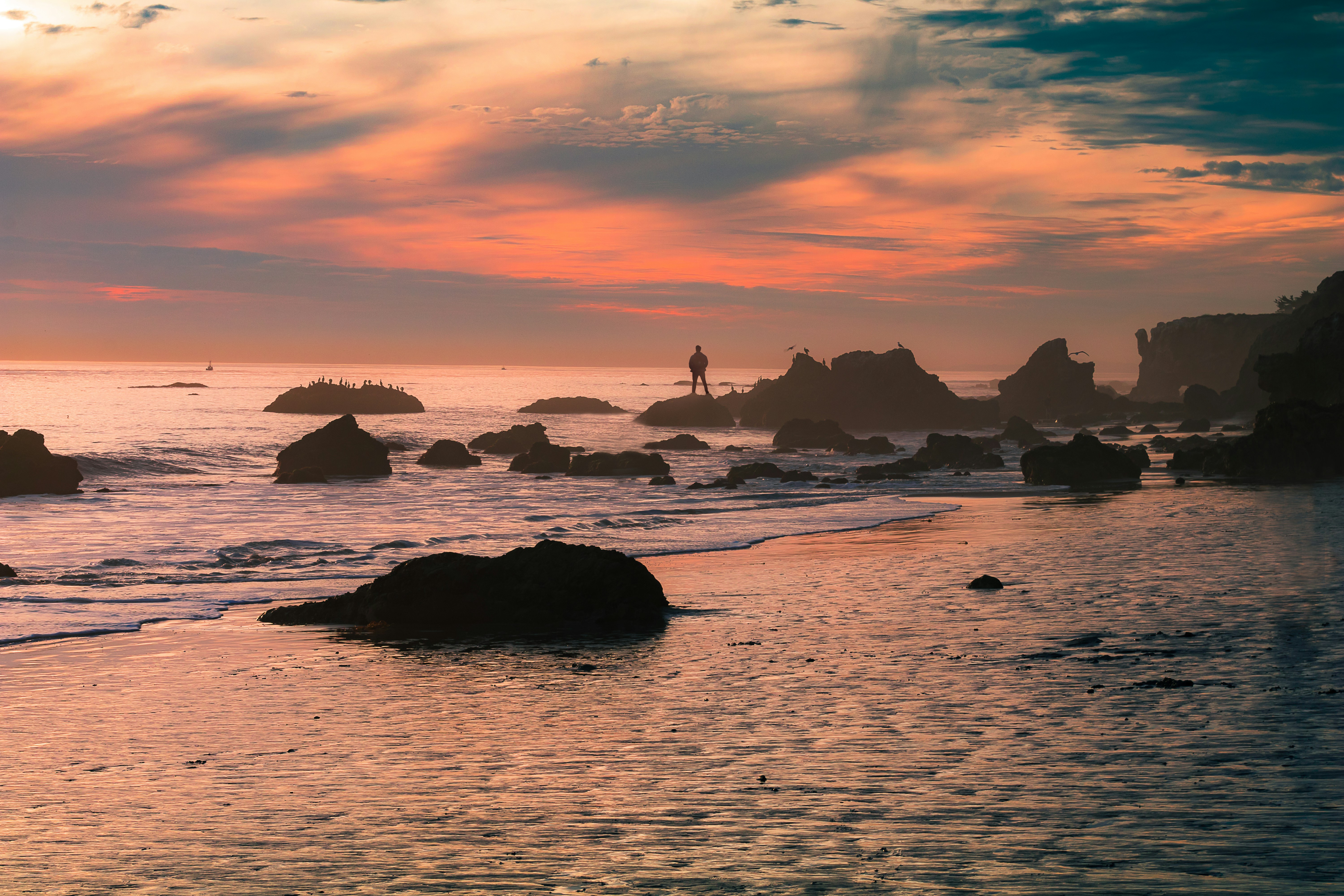 Watching the sunset in El Matador Beach in Malibu, CA.