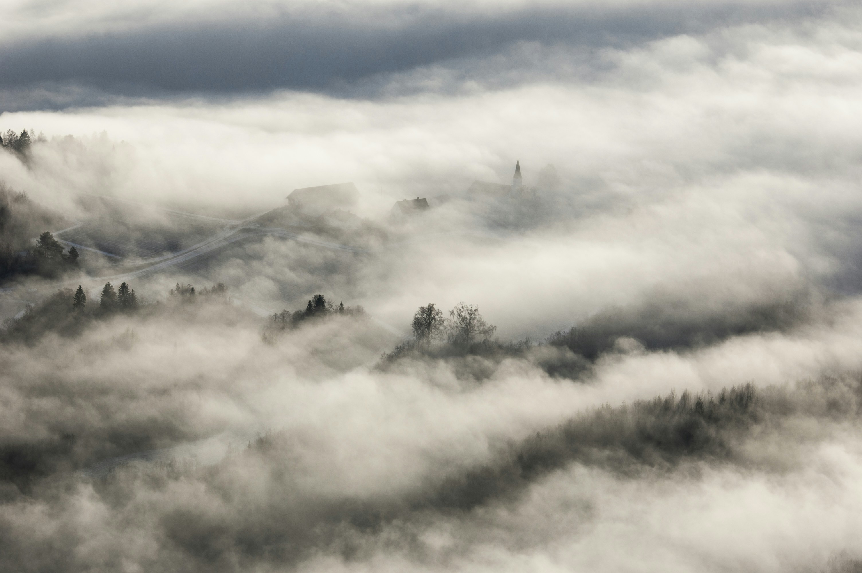 Hidden Village | photo of fog on mountain