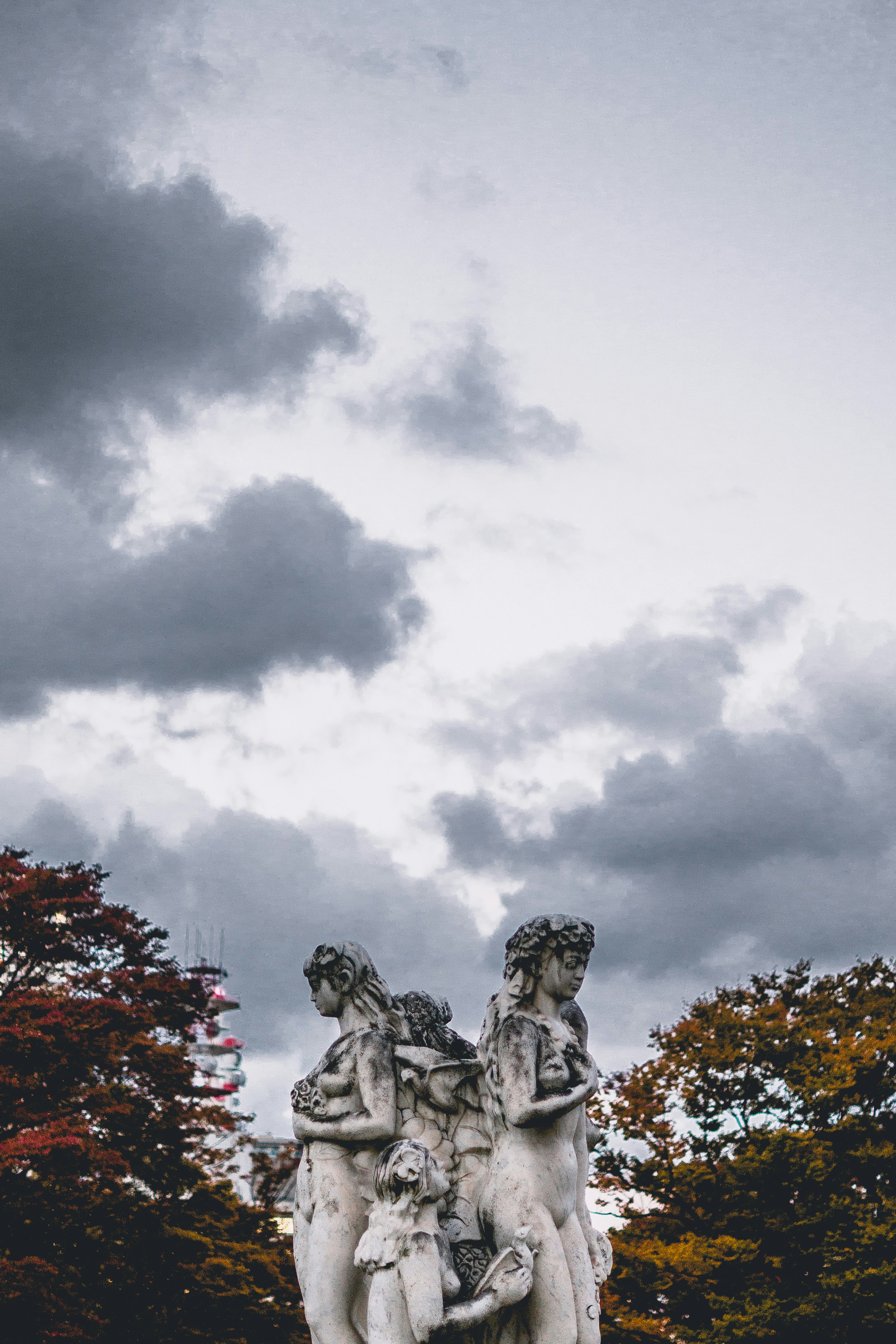 Female concrete statue under white clouds photo – Free Japan Image on ...