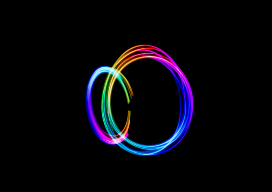 Life off screen doesn’t have to mean you stay in the darkness.   Nights learning poi spinning at the beach were quite fun! | time-lapse photography of person doing circle rainbow light
