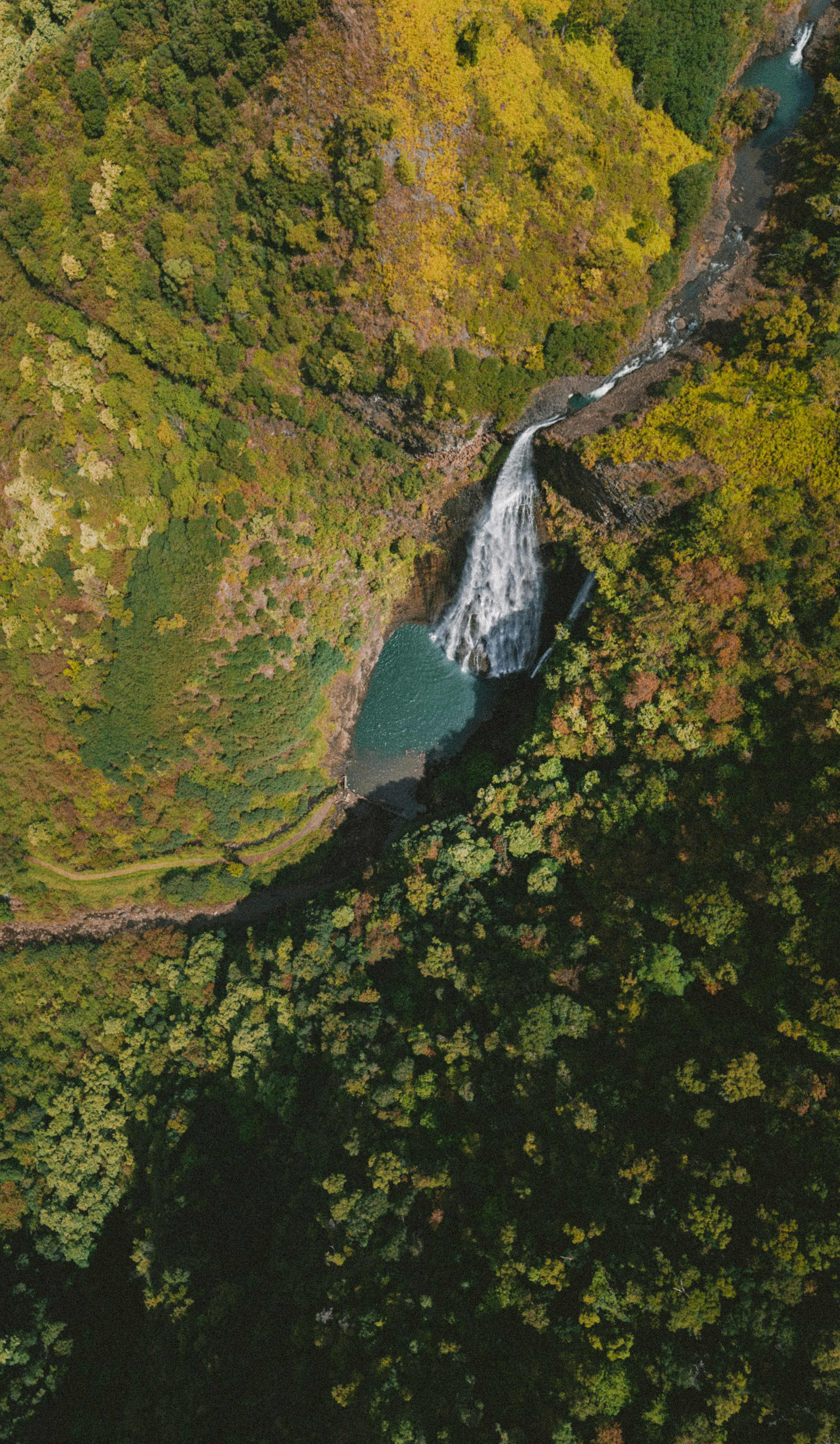 Bird's eye view of flowing waterfalls between mountains photo – Free ...