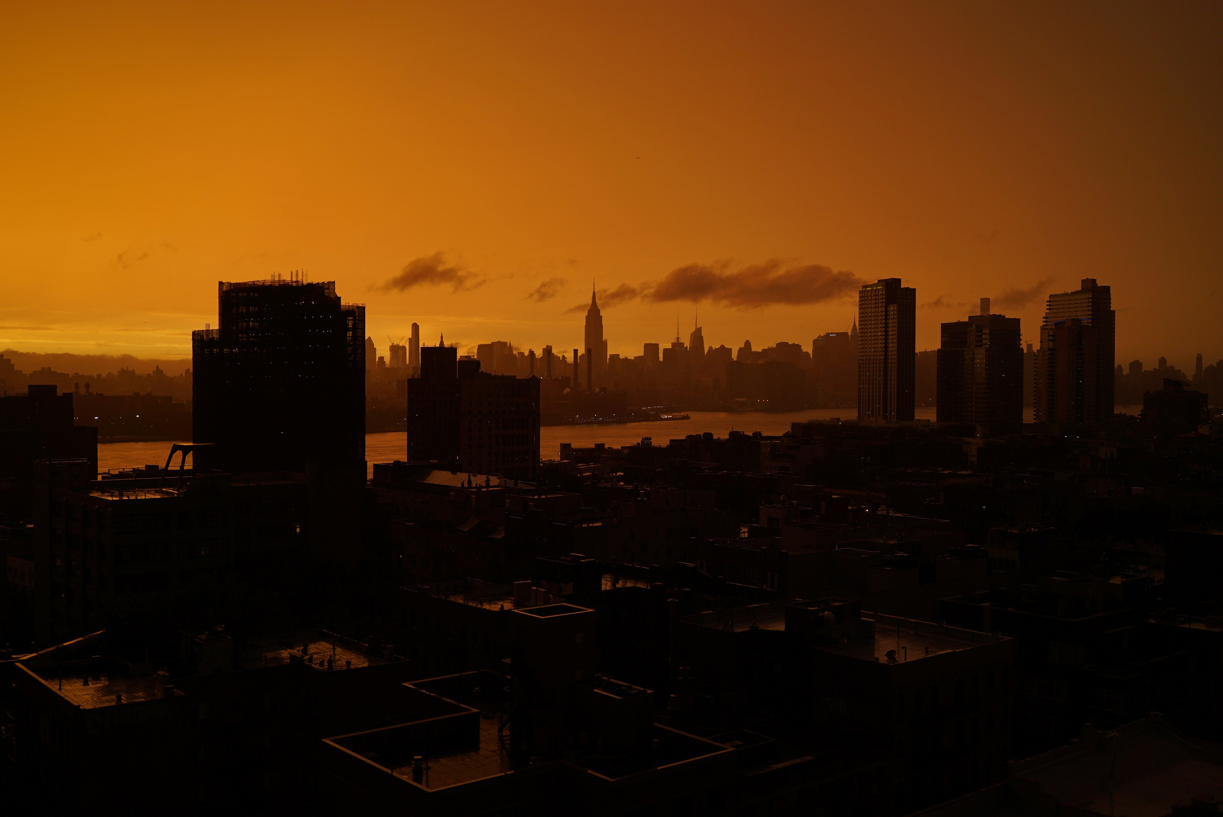 Golden Hour Silhouette: Manhattan's Skyline at DuskJason McCann