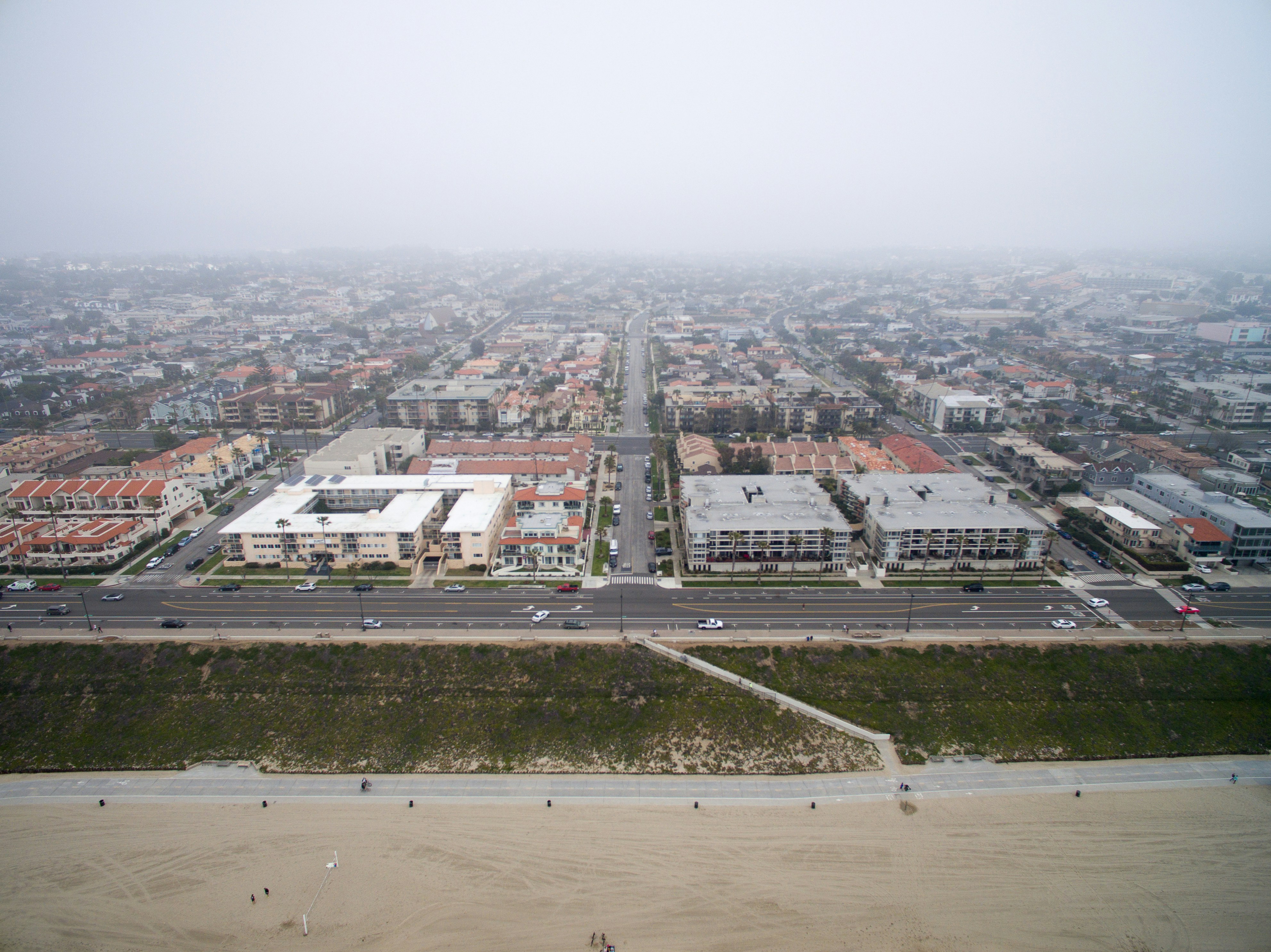 Coastal Grid: Aerial View of Beachfront Blocks and the Highway Spine