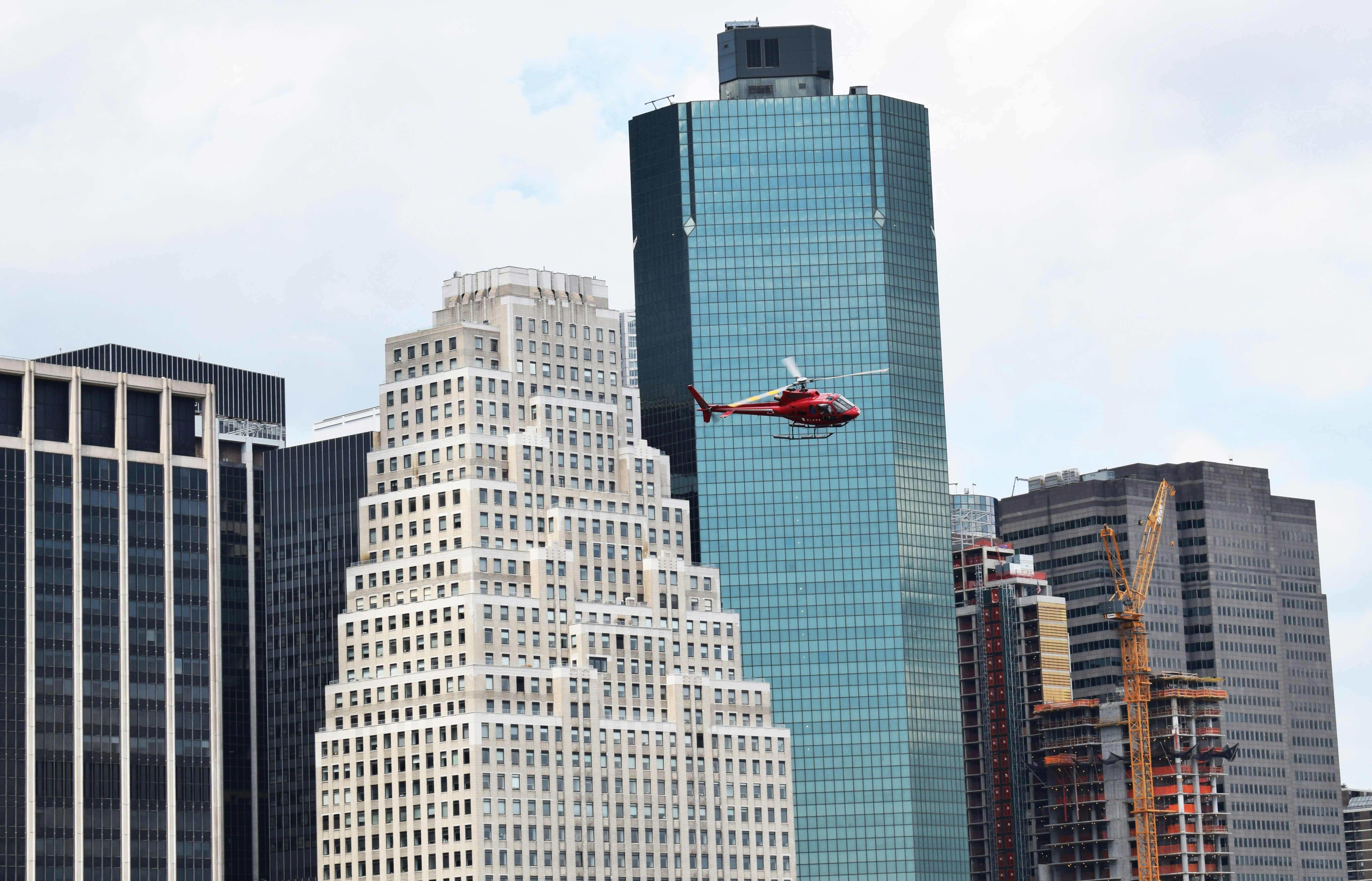 Helicopter flying around high-rise buildings photo – Free Architecture ...