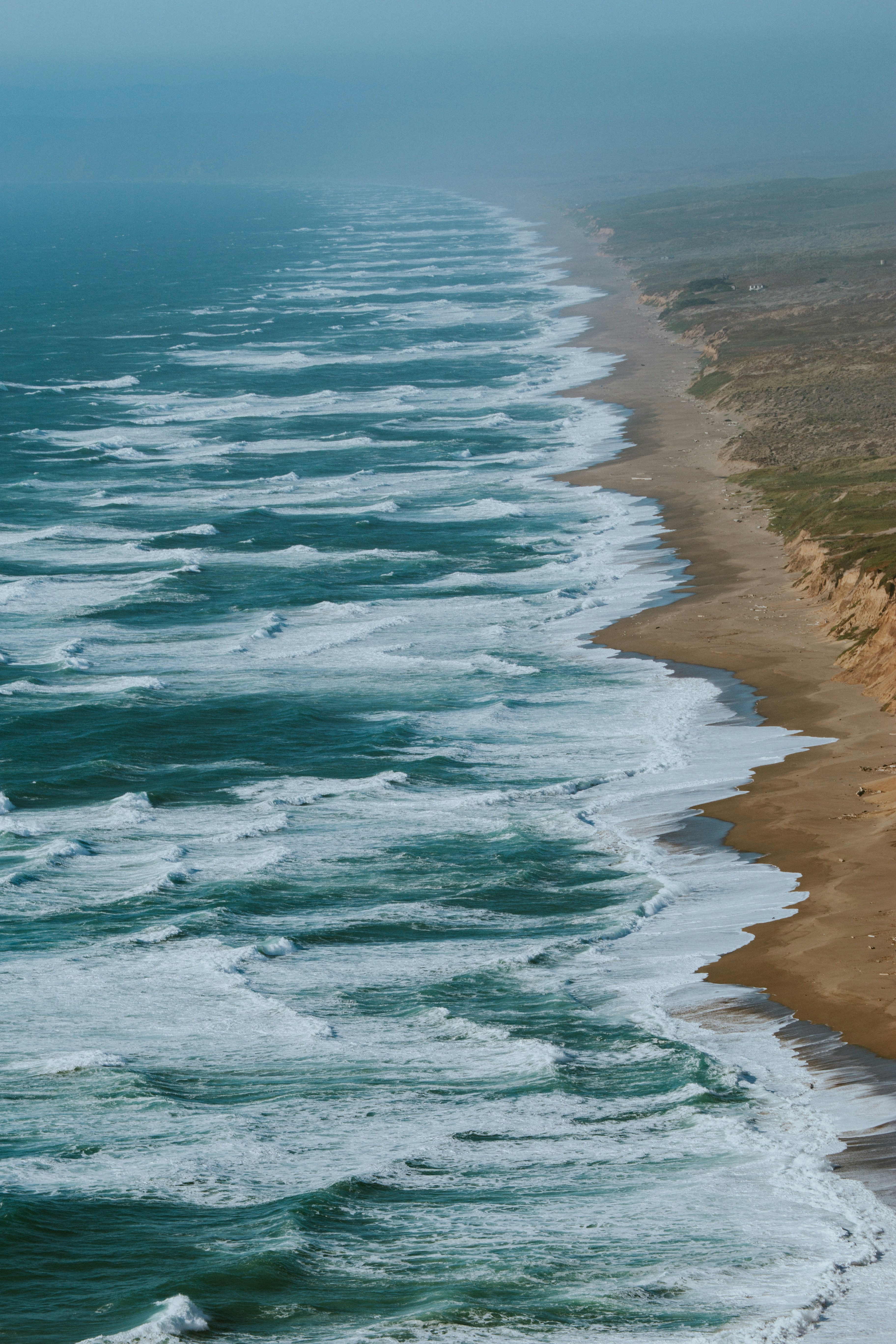 Aerial photography of ocean waves hitting shore photo – Free Point ...