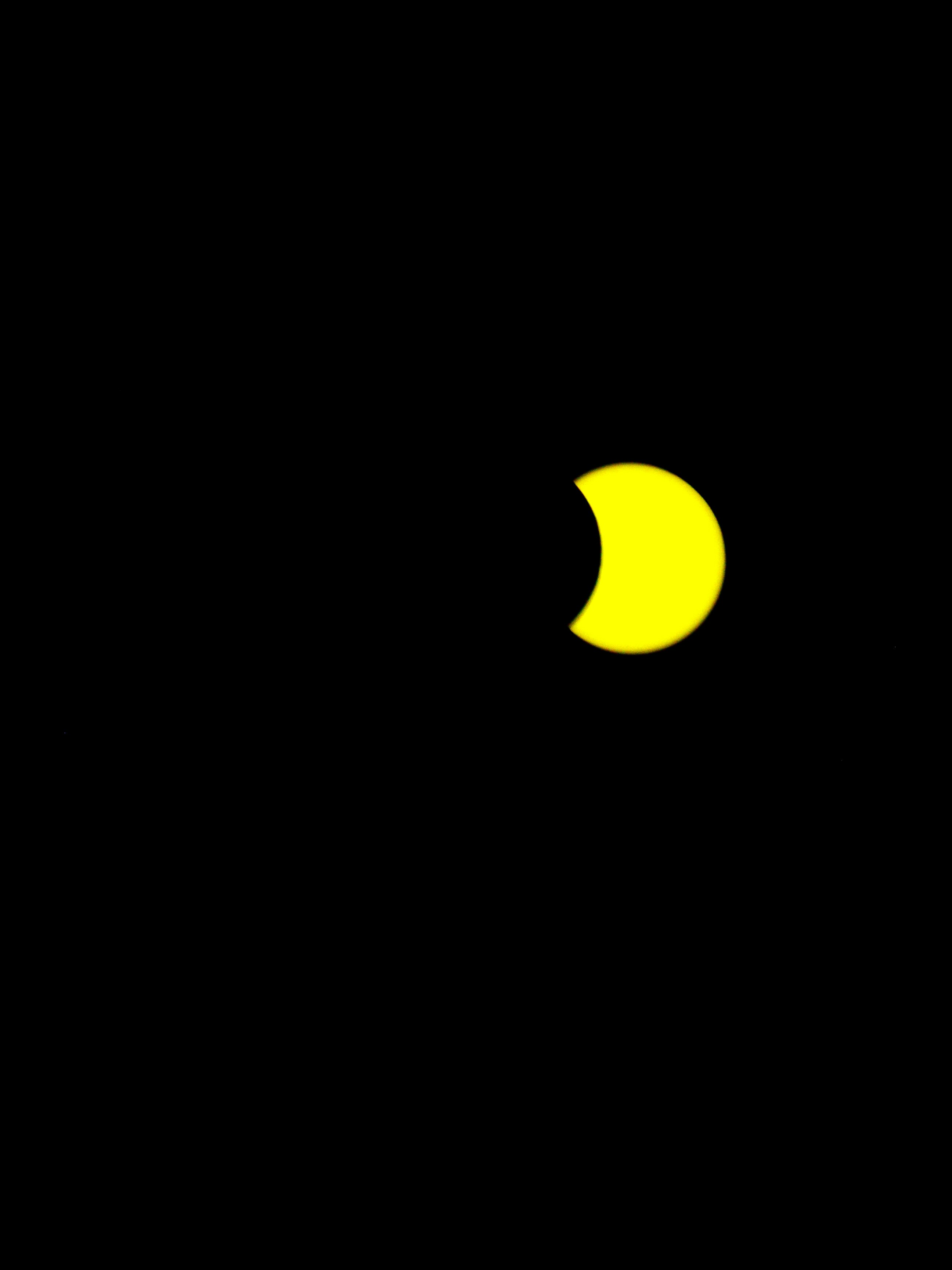 Celestial Bite: The Sun's Partial Eclipse