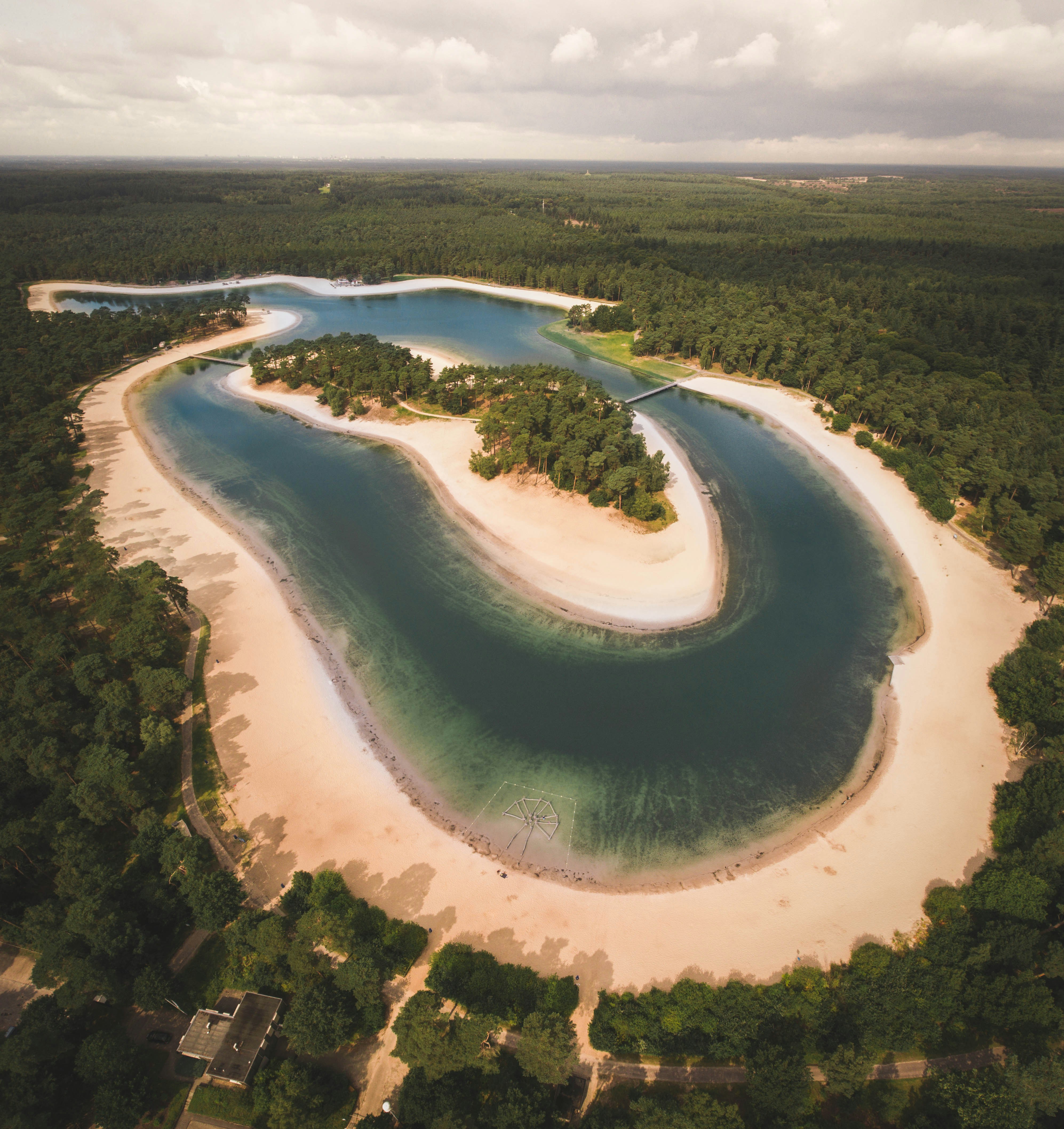 Meander in Sand and Pines: A Lagoon Loop with a Winding Sandbar