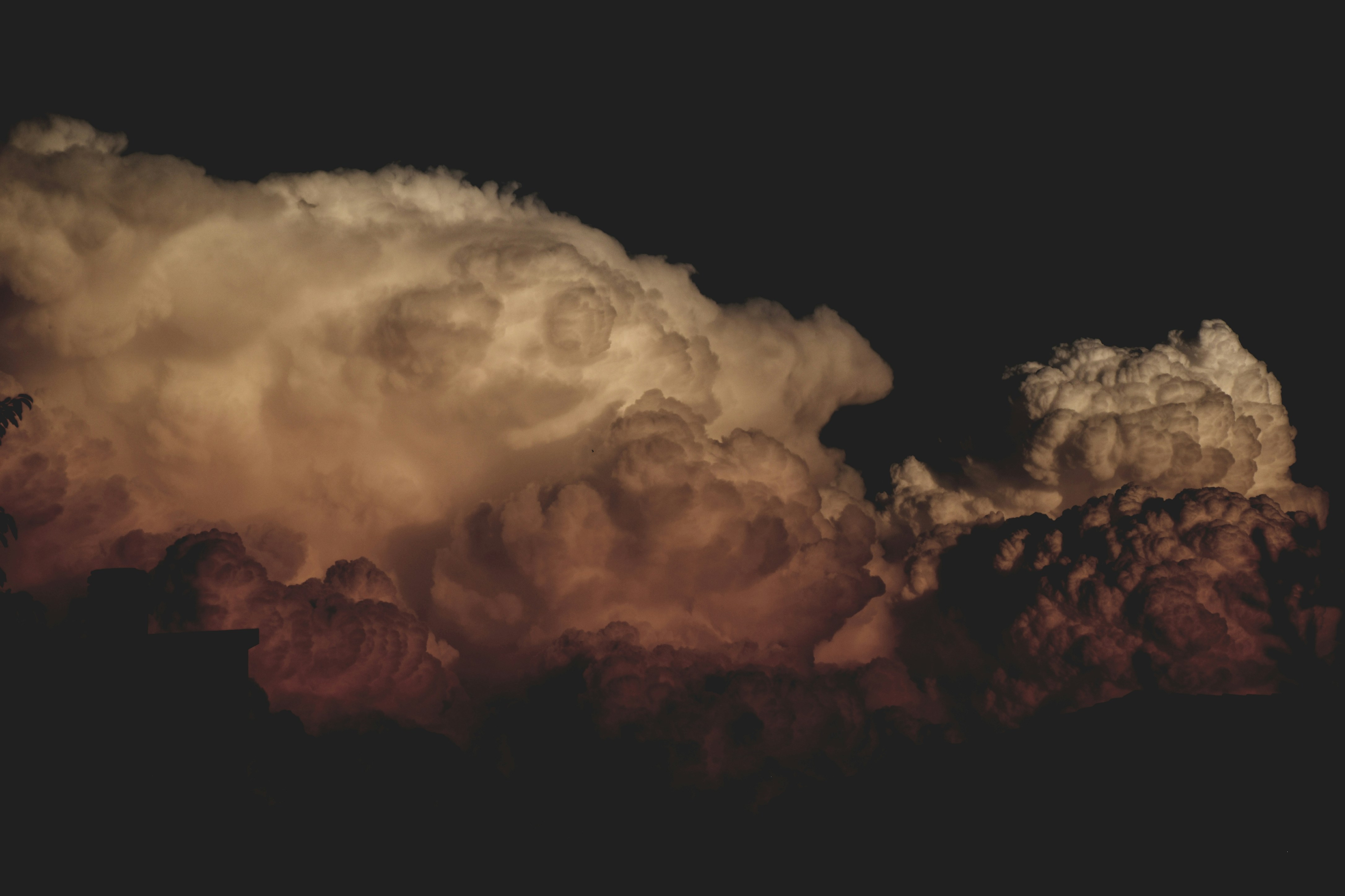 The forecast said storm incoming. I positioned myself on my patio with a book and a camera, ready to snap pictures if an opportunity would arise. I spent the next hour taking pictures of these strange clouds as they floated slowly across the horizon.Leonardo Yip
