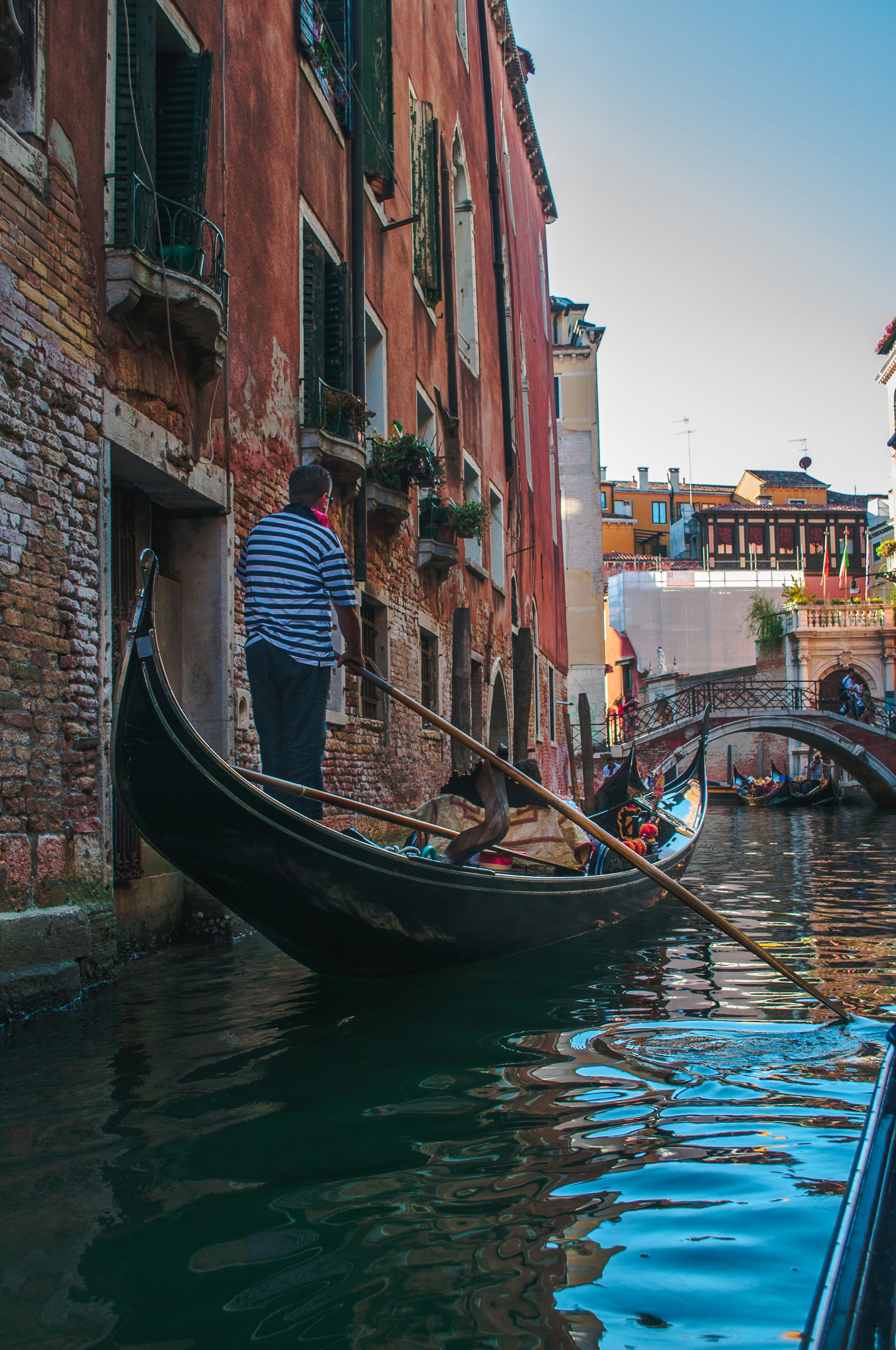 Man riding boat at Venice Canal photo – Free Italy Image on Unsplash