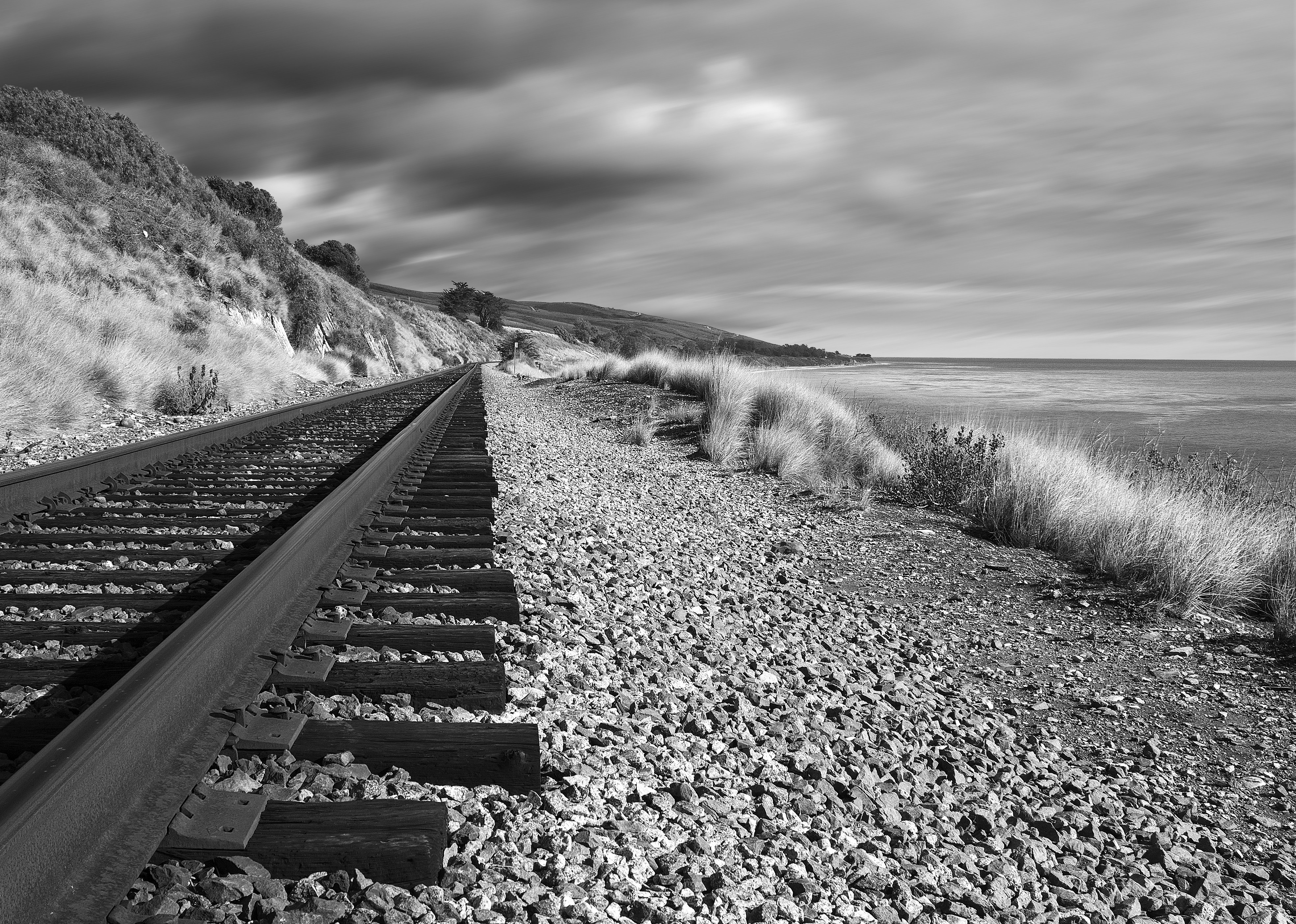 Grayscale photo of train rail photo – Free Grey Image on Unsplash