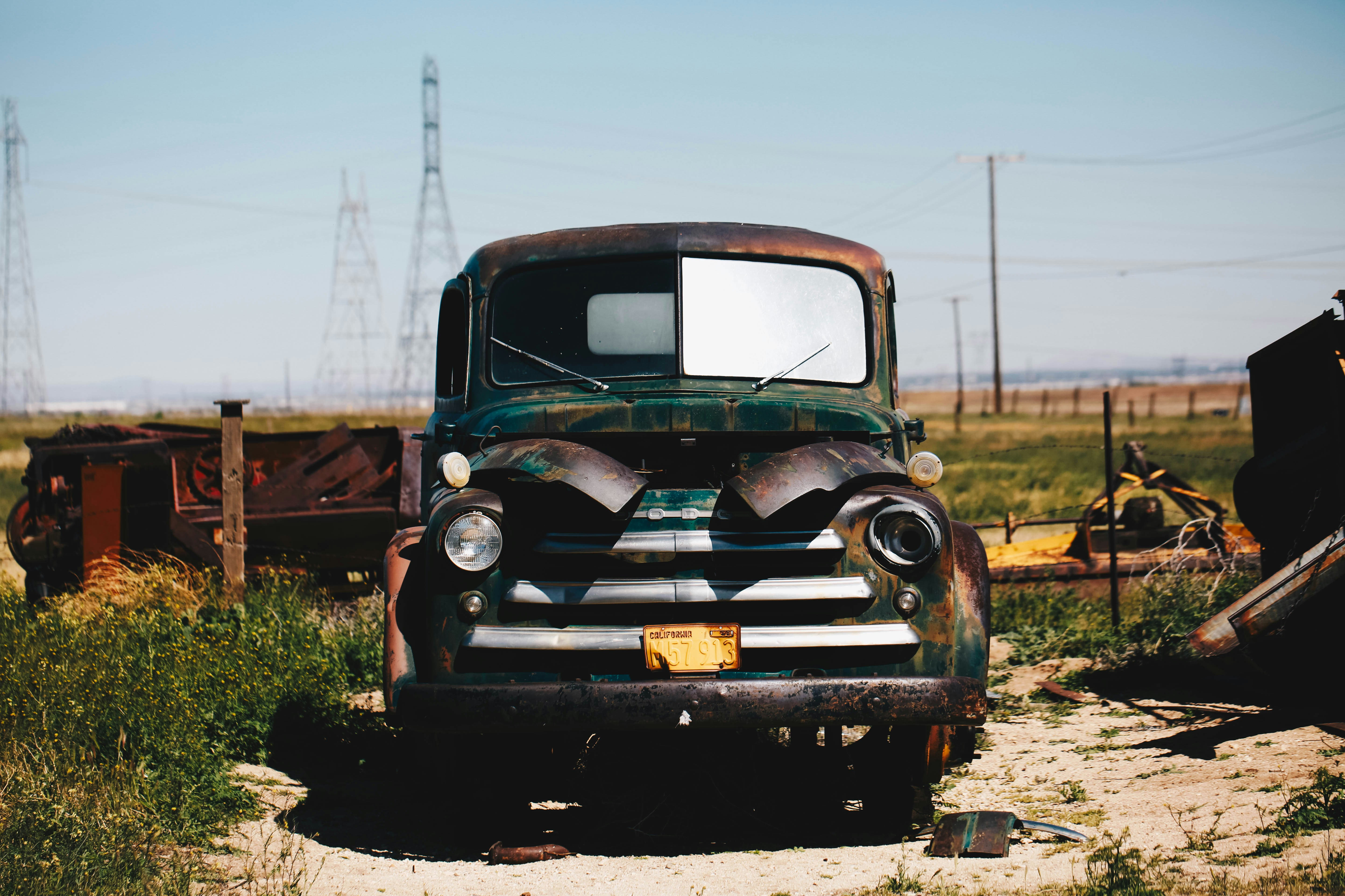 Front-Row Relic: A Rusted Truck Guarding the Desert Scrapyard