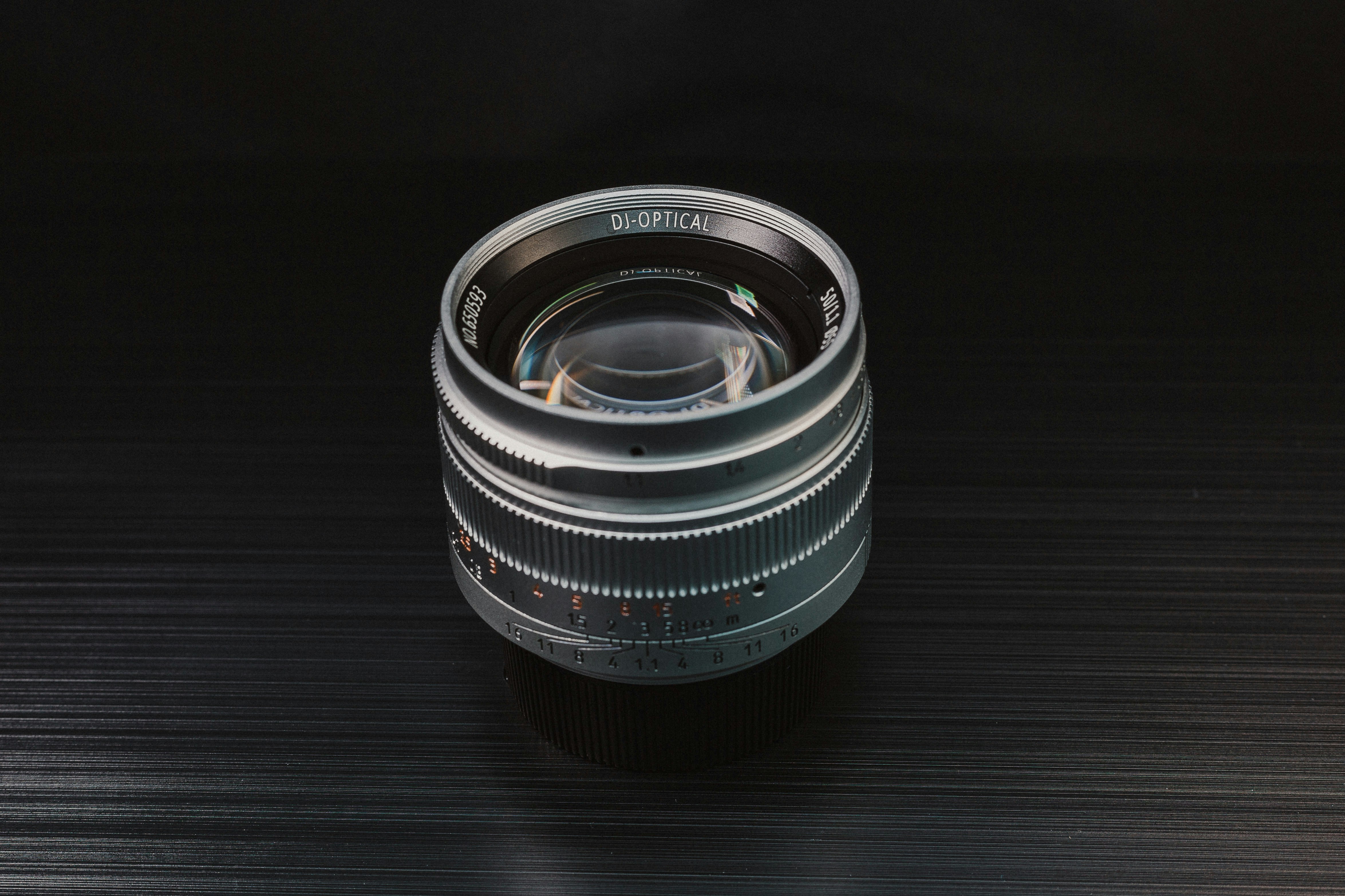 Close-up of a high-quality camera lens showcasing intricate details and craftsmanship.