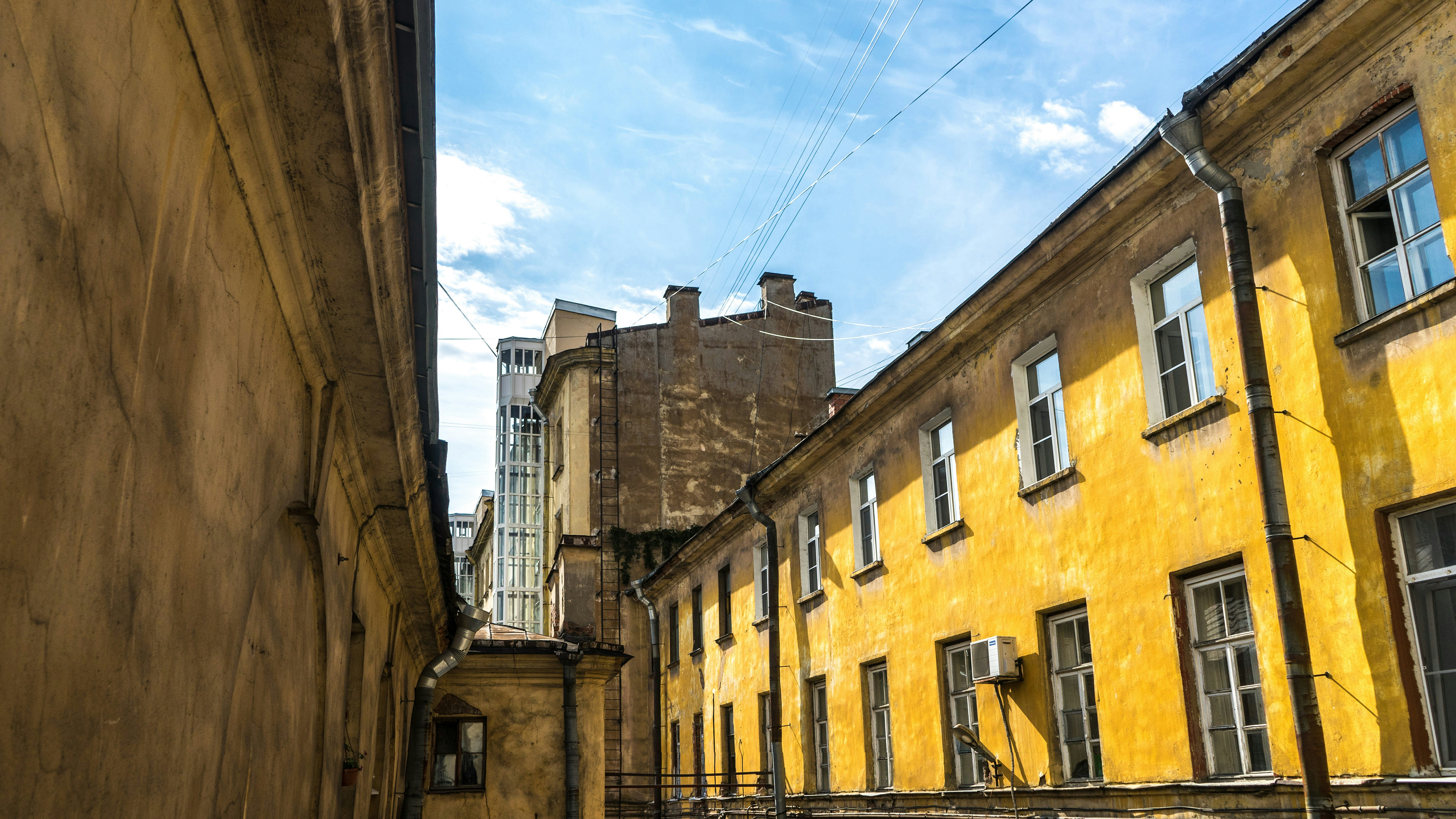 Golden Facades in Urban Alleyway