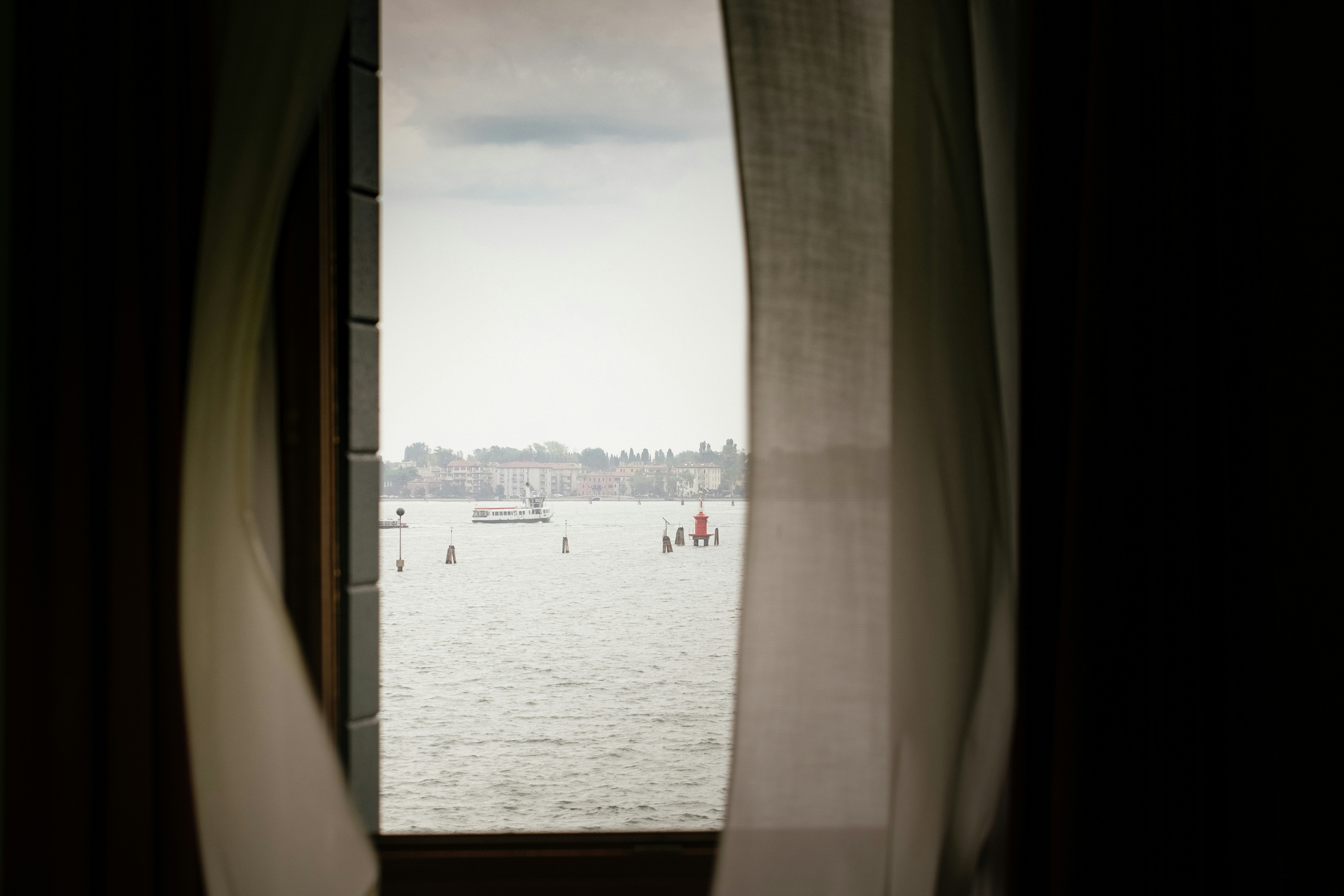 Framed Serenity: A Glimpse of Tranquil WatersManuele Sangalli