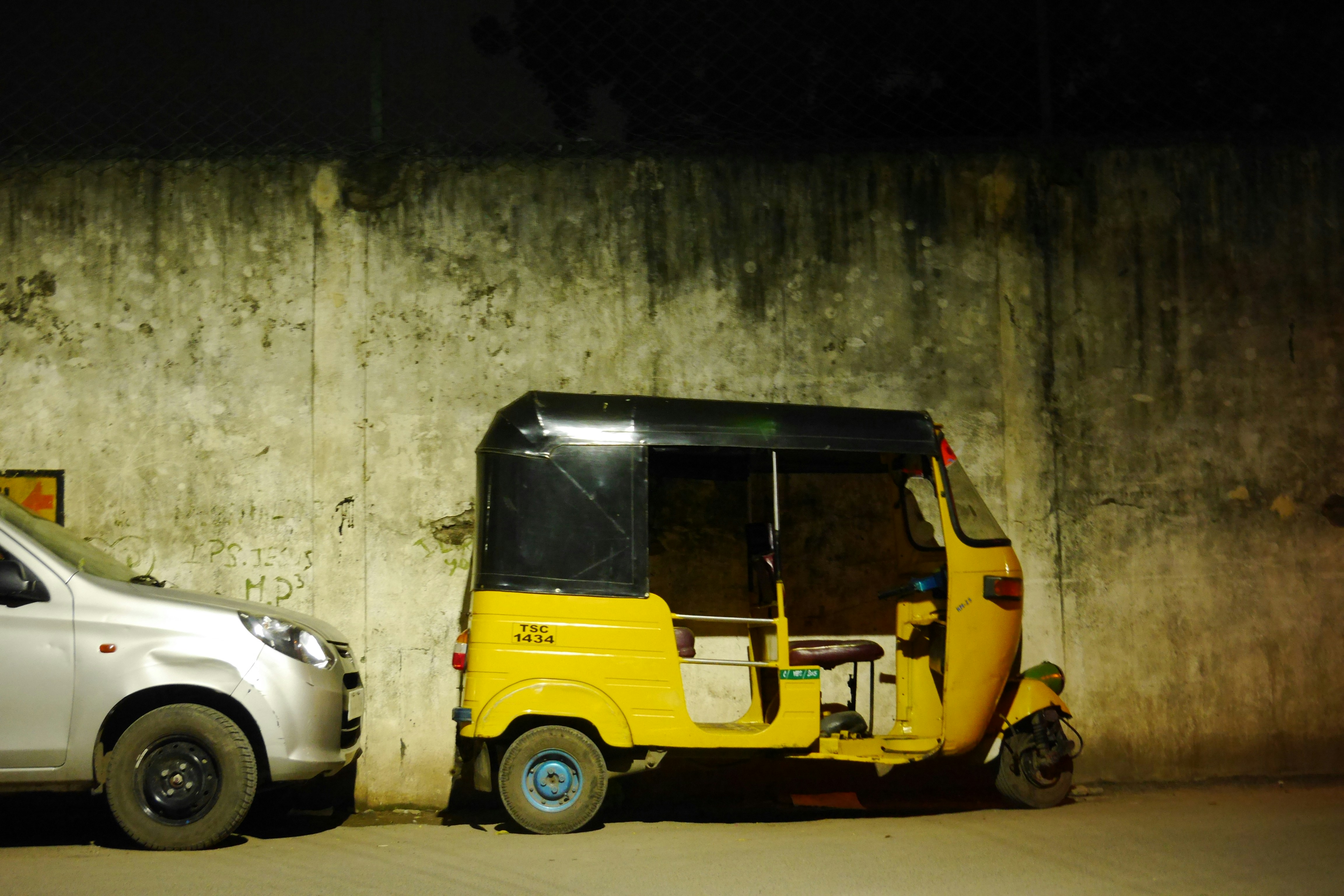 Auto rickshaw beside concrete wall and silver car photo – Free Car ...