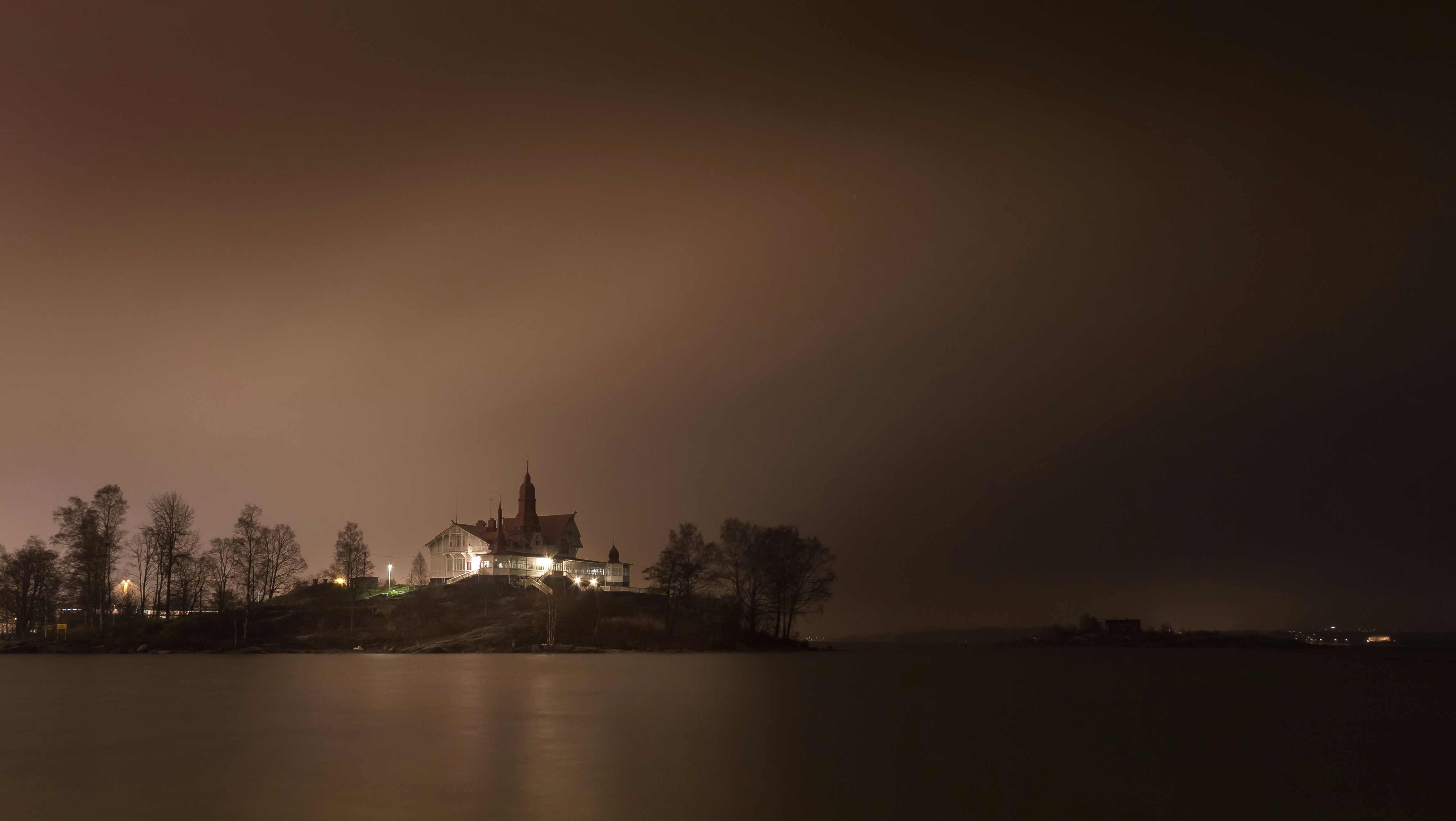 Amber Glow on a Hilltop Church Beneath a Velvet Night
