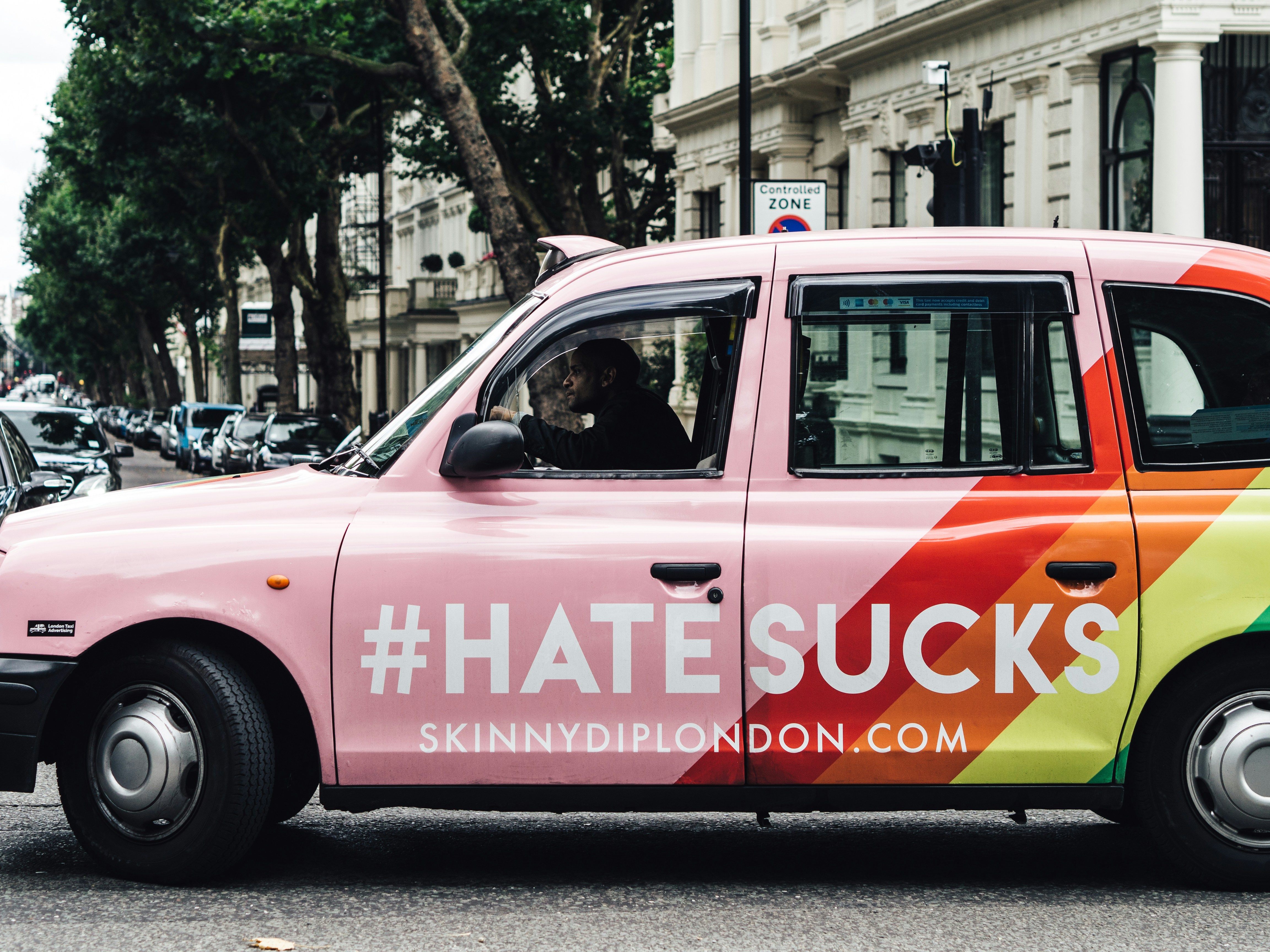 Pink and orange 5-door hatchback with #Hatesucks print photo – Free Car ...