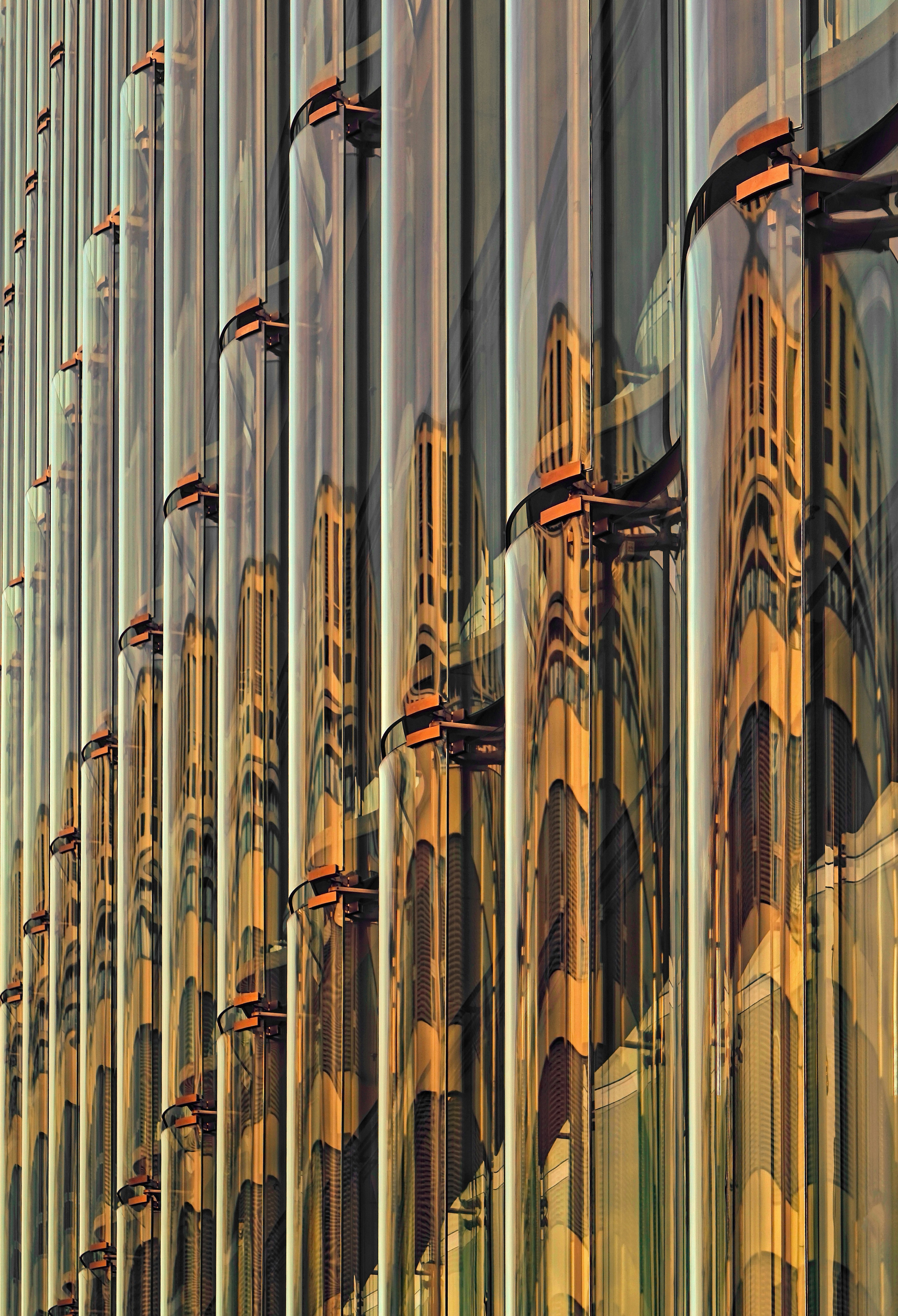 Arched Echoes on a Glass Ribbon: Refracted Architecture