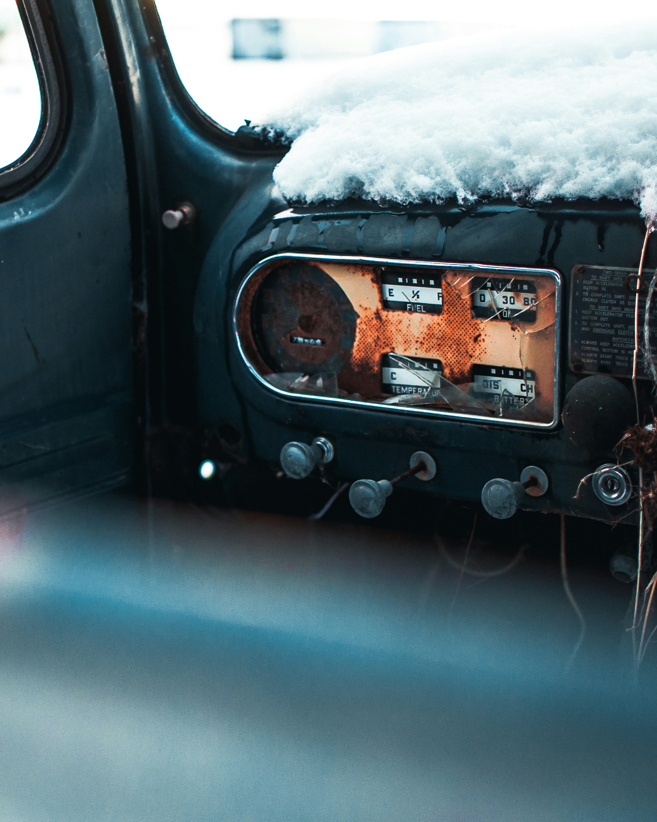 Snow-Glazed Dash: A Rusted Vintage Truck's Quiet Vigil