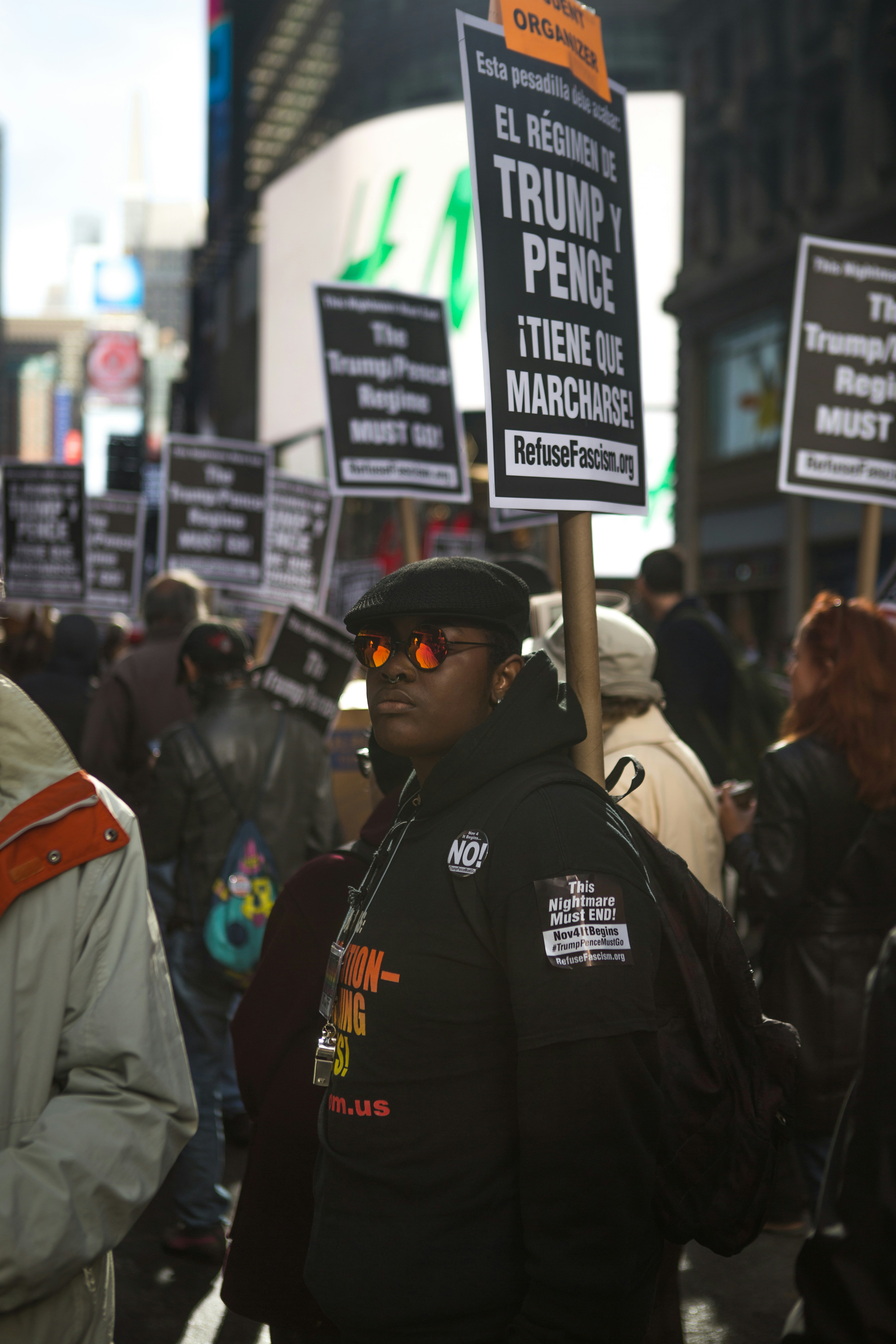 Man standing near protesters photo – Free Sign Image on Unsplash