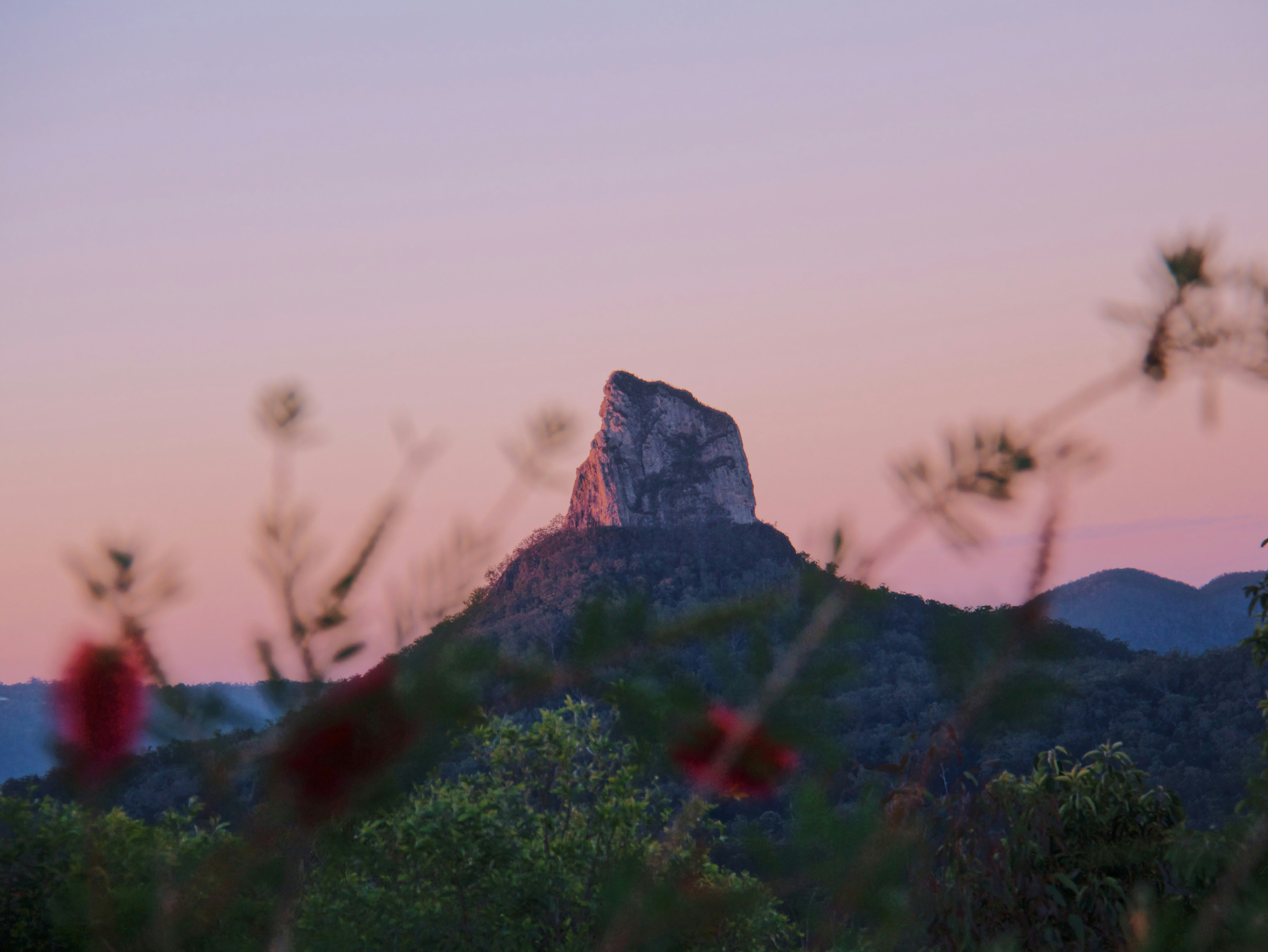 Twilight Sentinel: The Lone Pinnacle Above Quiet Hills