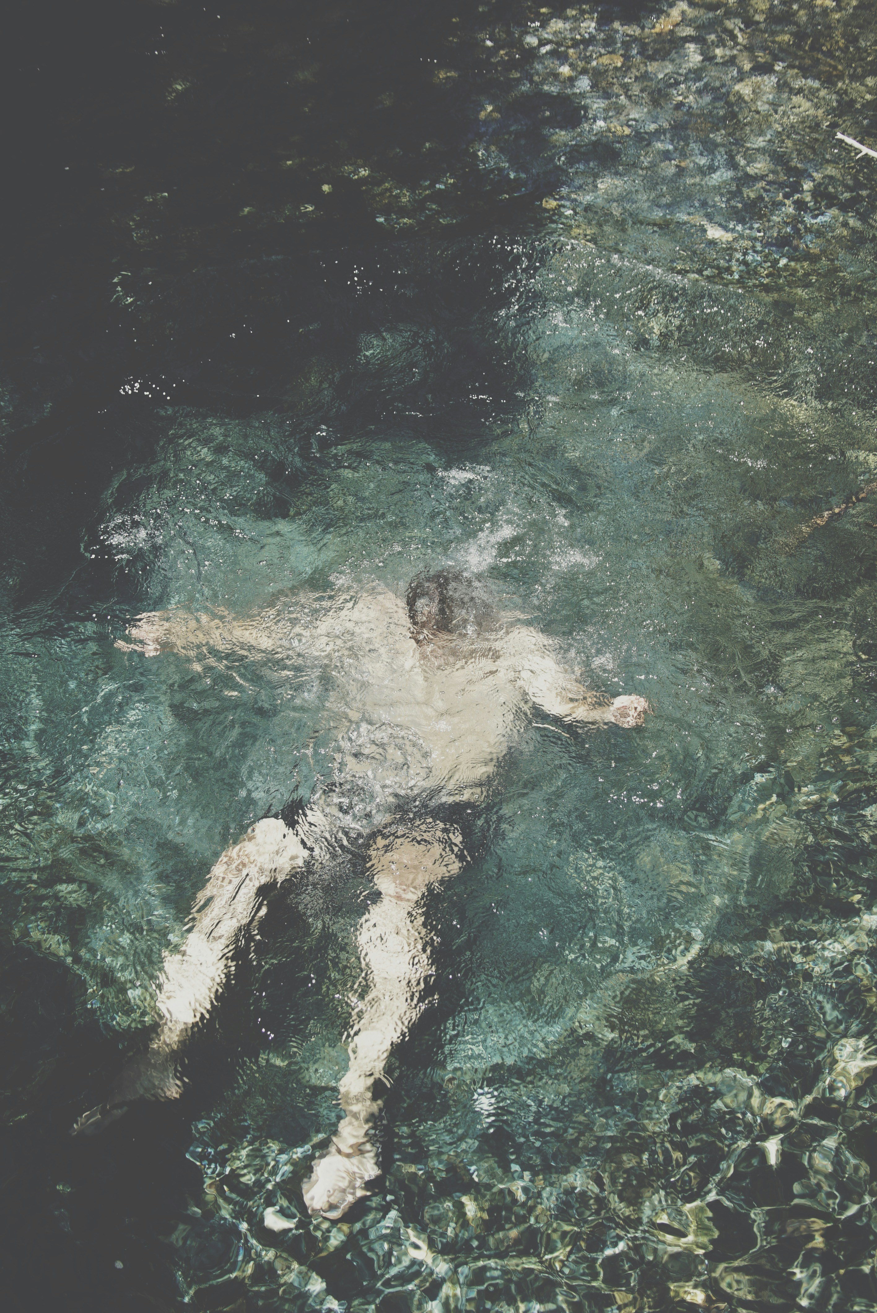 Person submerged underwater photo – Free Grey Image on Unsplash
