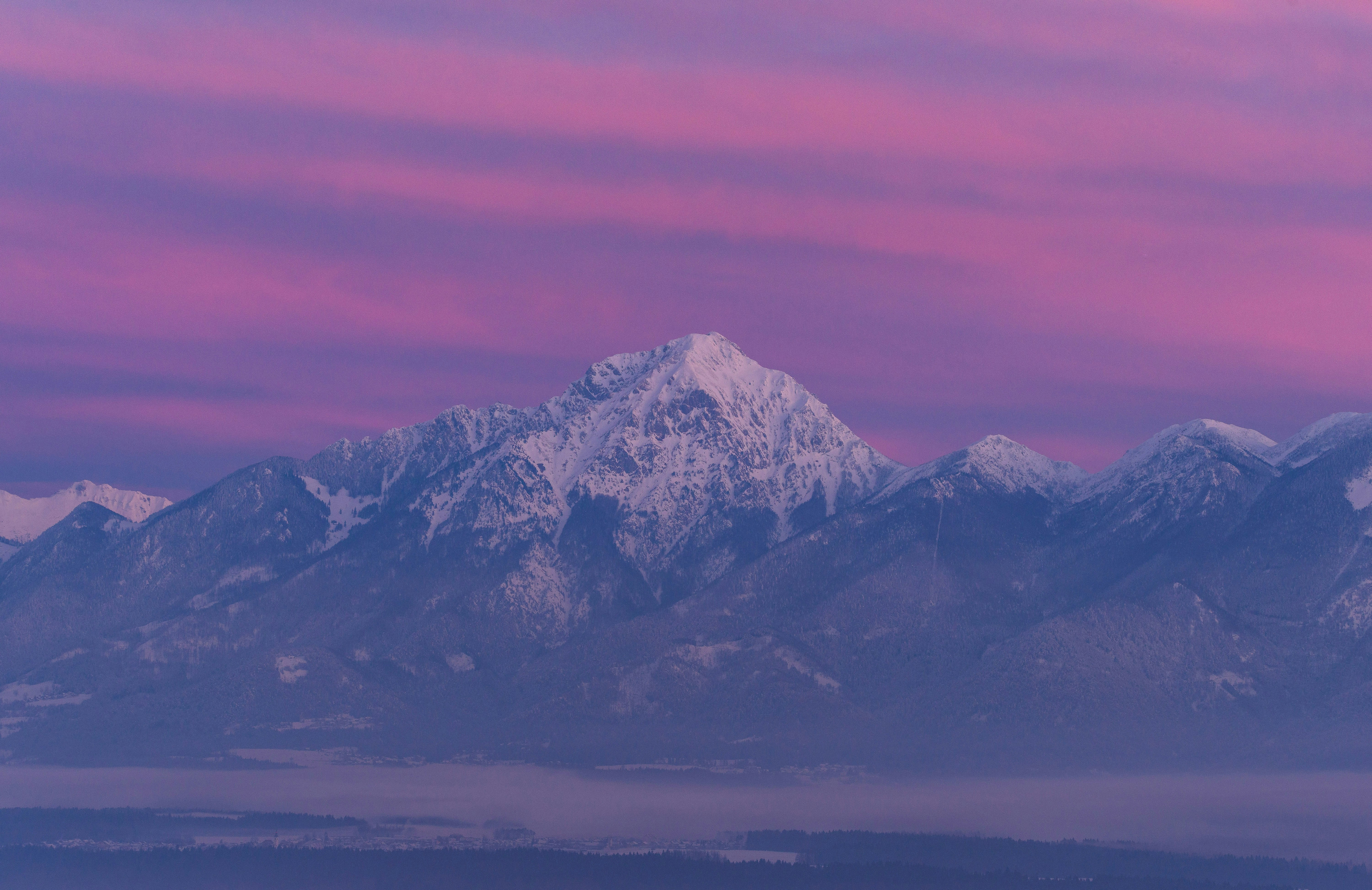 Gray stone mountain covered by snow photo – Free Sunrise Image on Unsplash