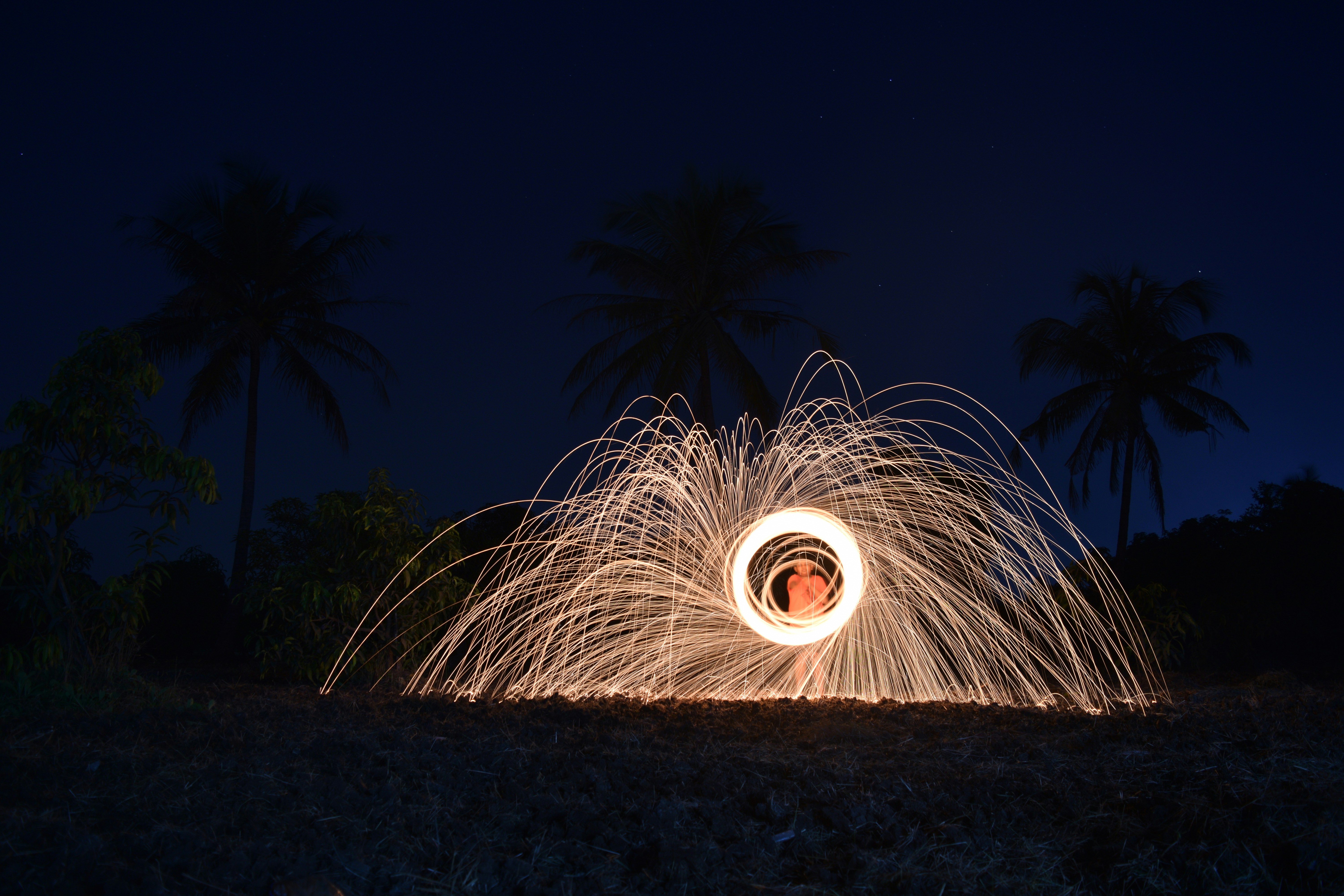 Fiery Halo Under Starry Skies