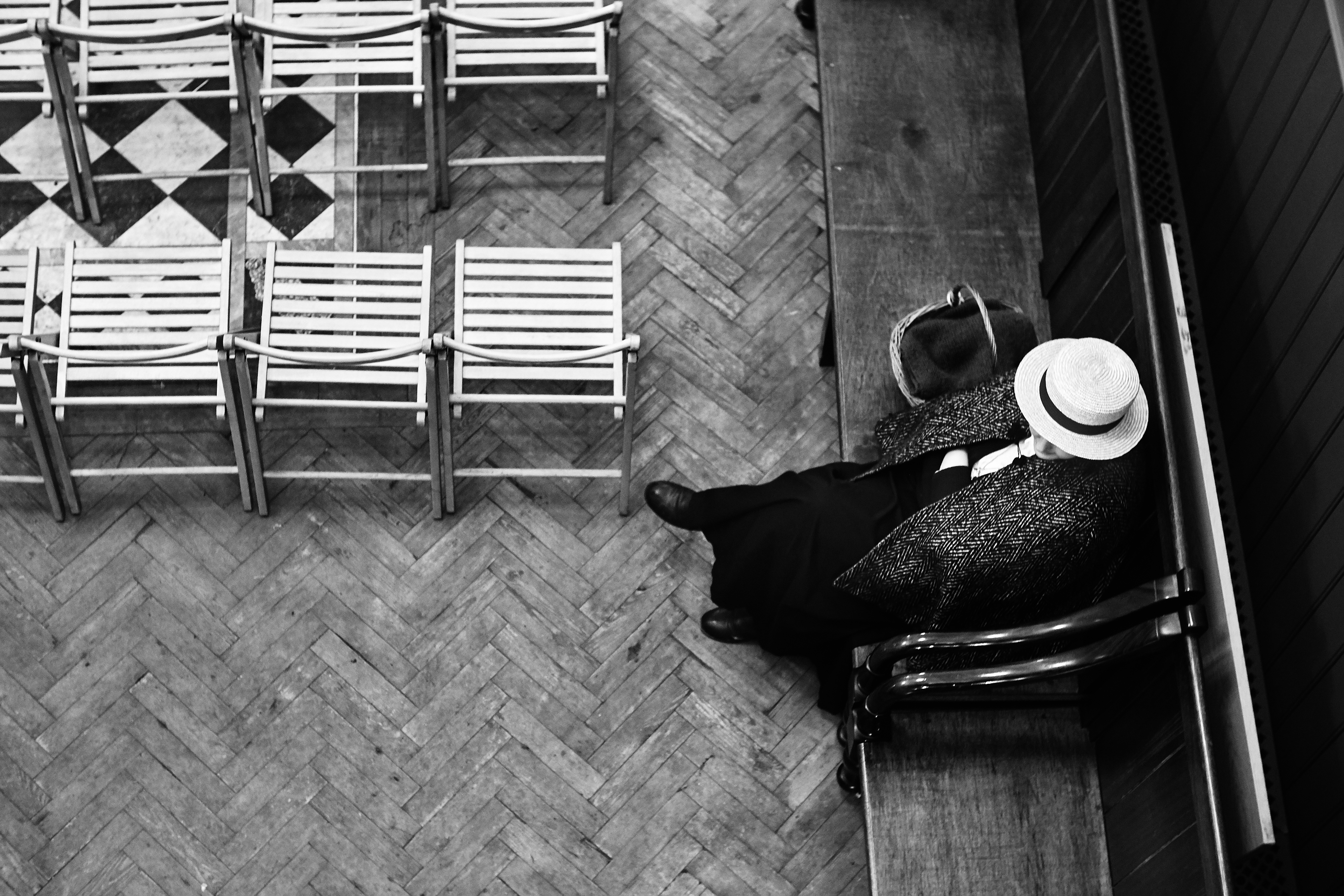 Inverted color photography of woman sitting on bench photo – Free ...