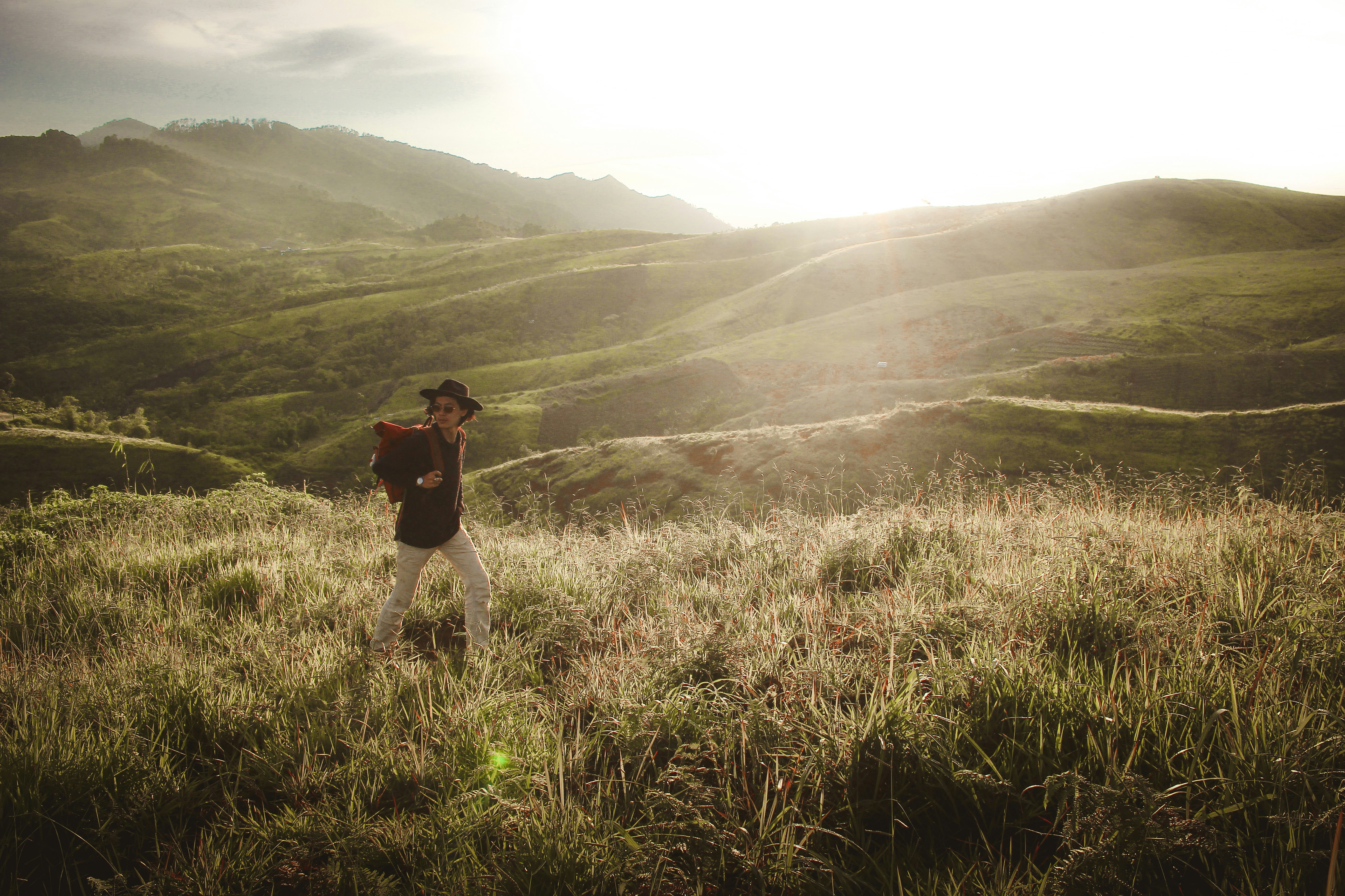 Cicalengka. West Java. INDONESIA | person walking across grassy field