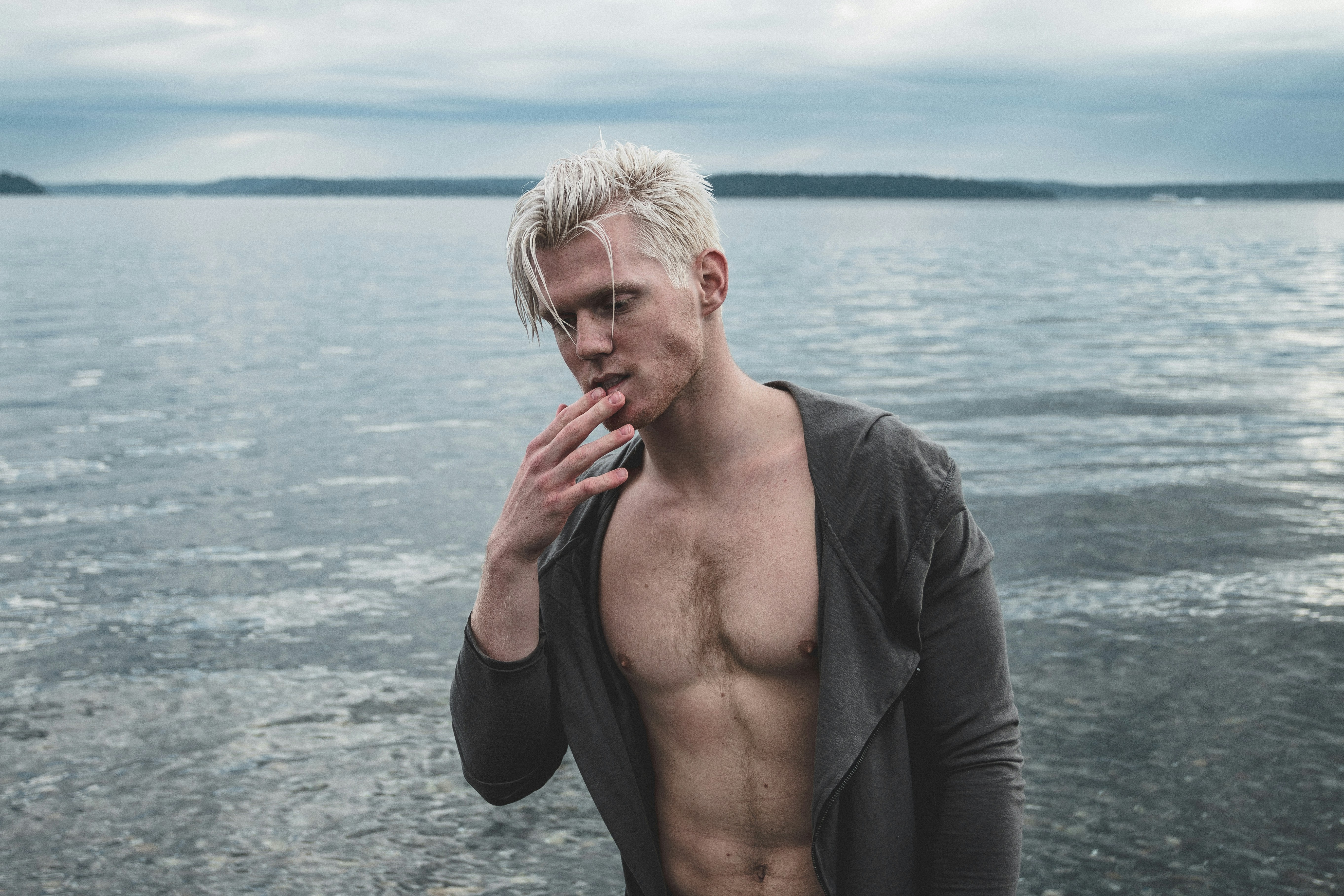 Man wearing black top near body of water photo – Free Alki beach Image ...